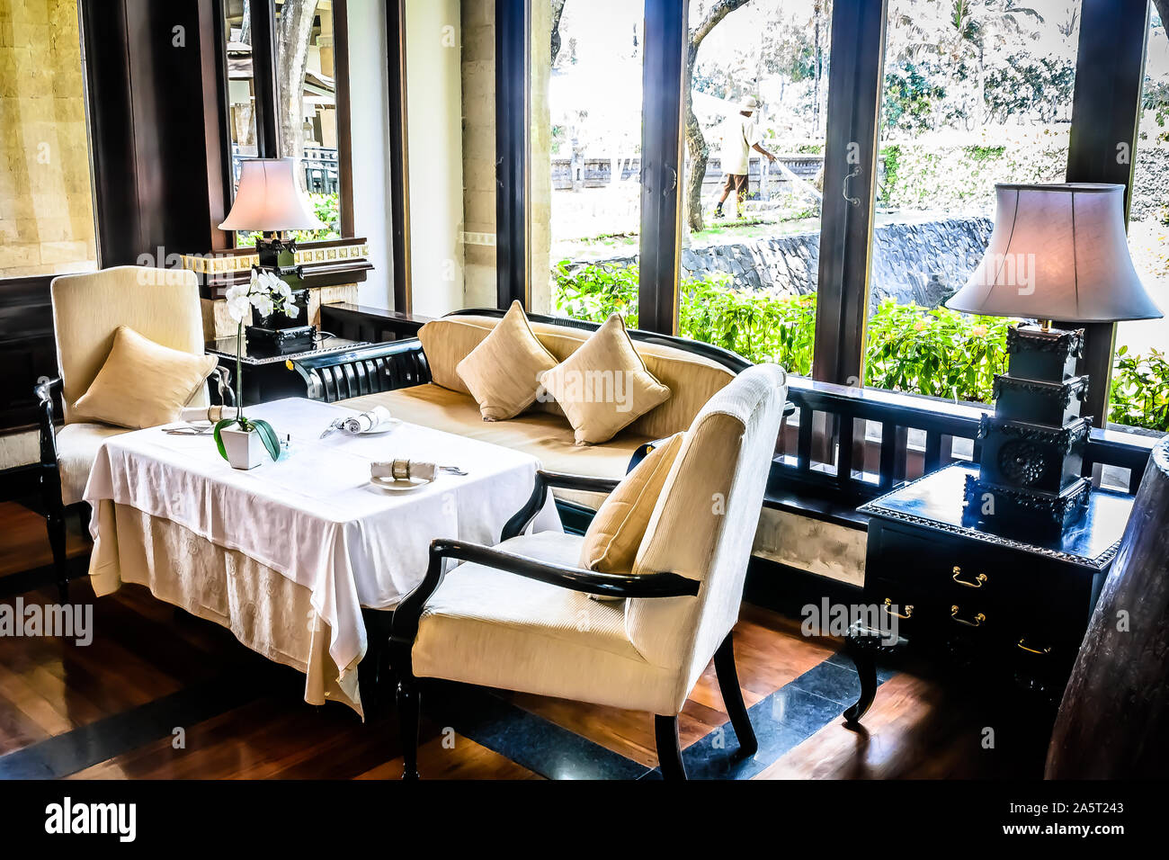 beautiful restaurant with white linen table cloths, white linen napkins ...