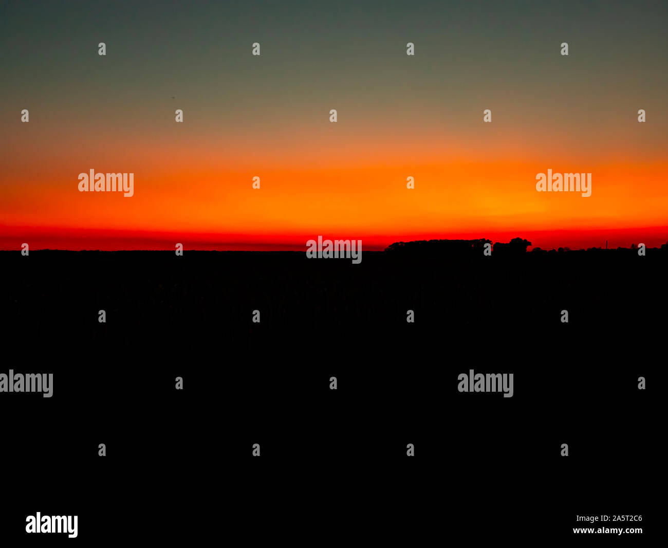 Red sunny sunset on the horizon. Natural background Stock Photo - Alamy