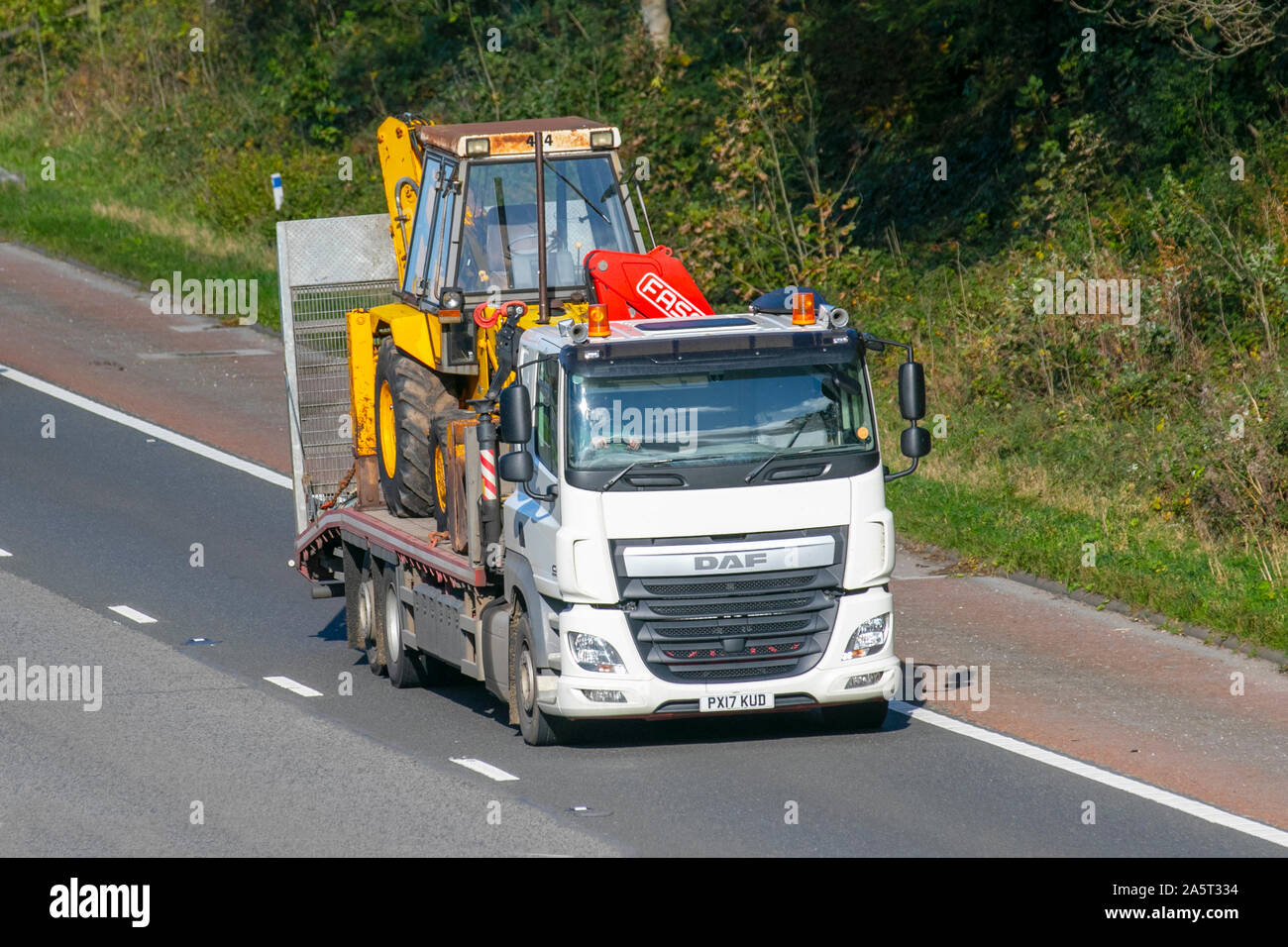 Haulage delivery trucks delivering JCB Digger, lorry, transportation ...