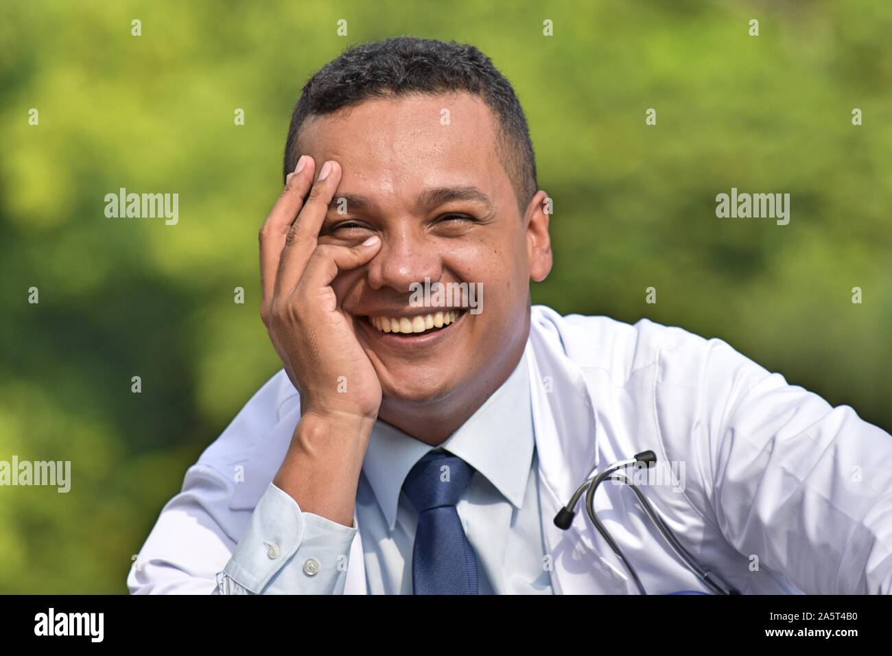 Happy Colombian Male Doctor Wearing Lab Coat Stock Photo - Alamy