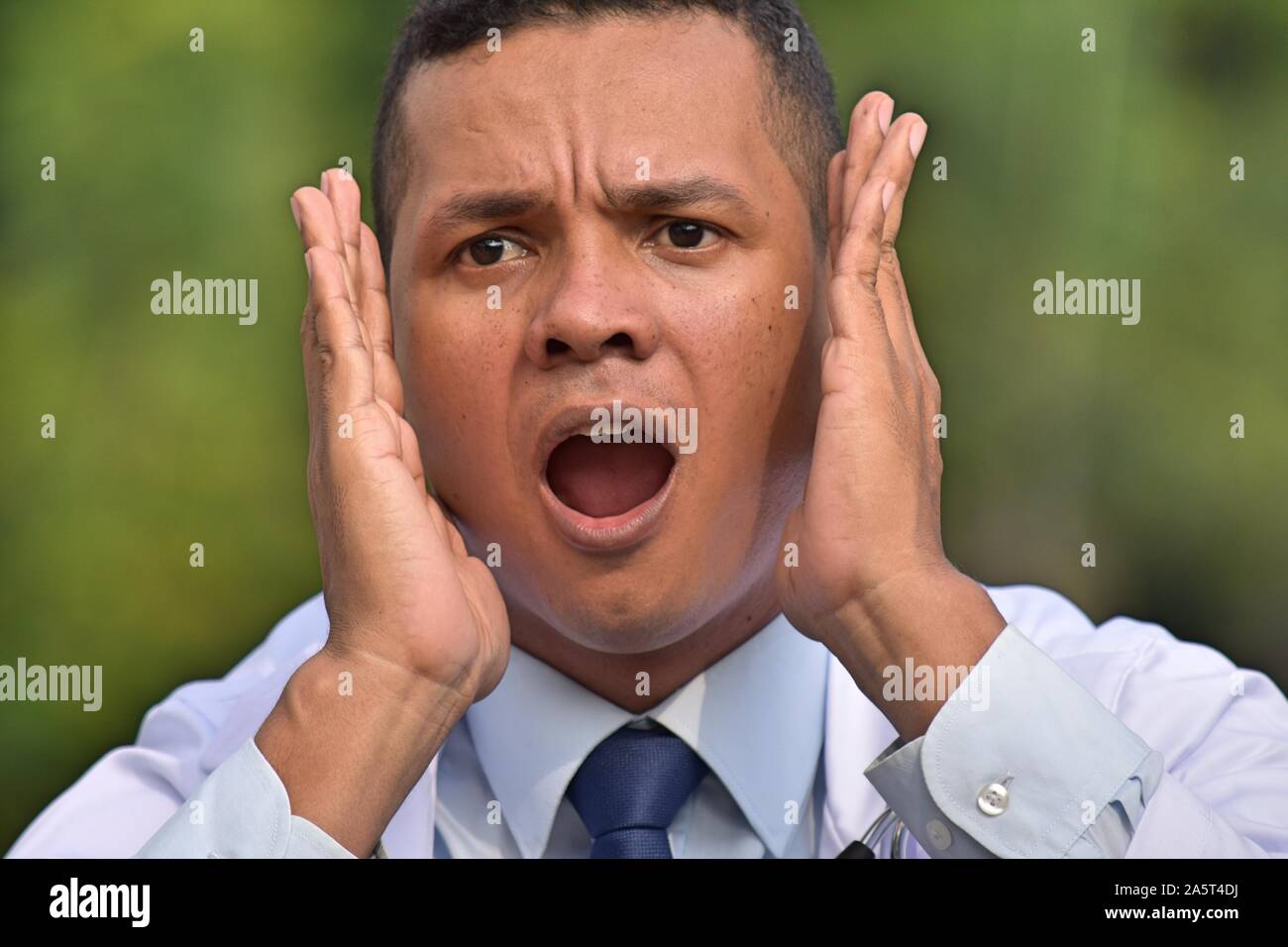 Surprised male doctor hi-res stock photography and images - Alamy