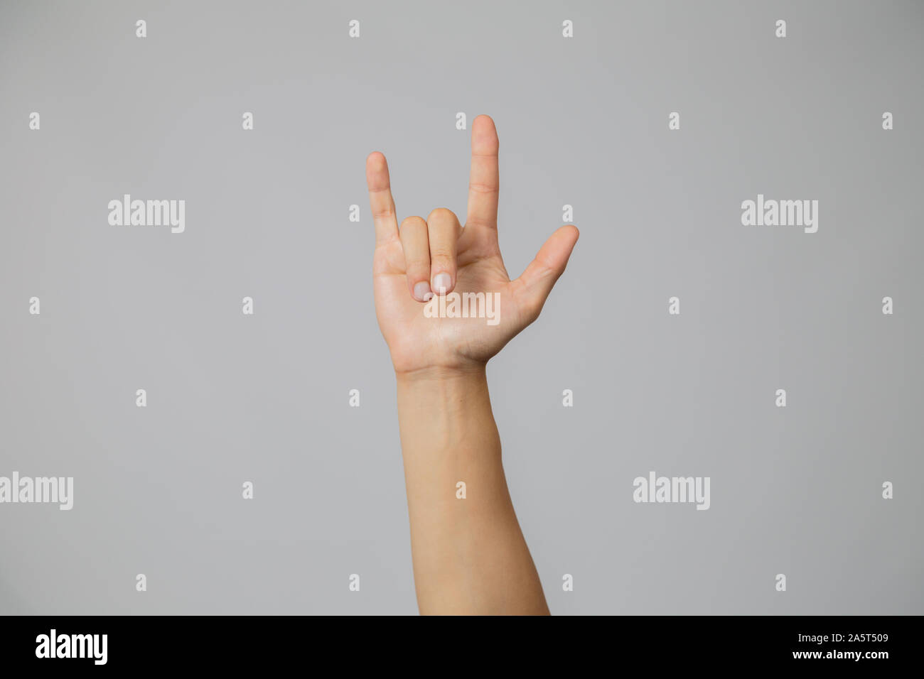 hand playing with fingers in studio with gray background Stock Photo ...