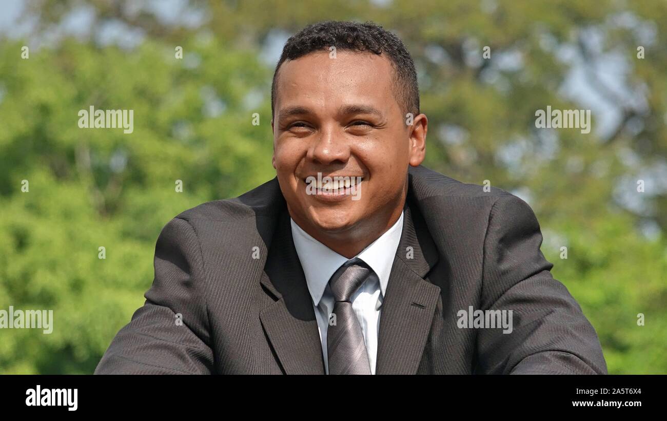 Minority Business Man Smiling Stock Photo - Alamy