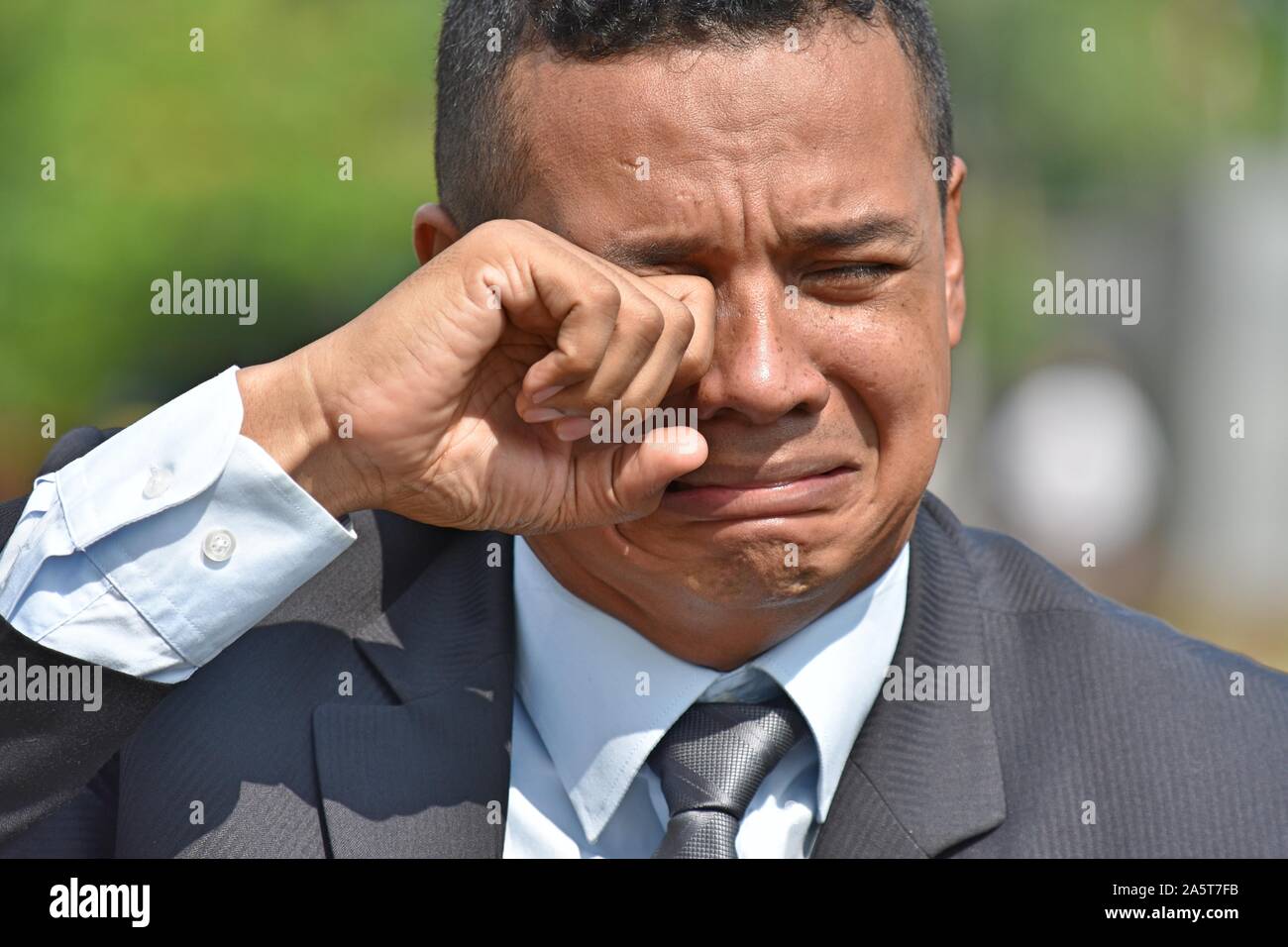Crying Handsome Business Man Stock Photo - Alamy