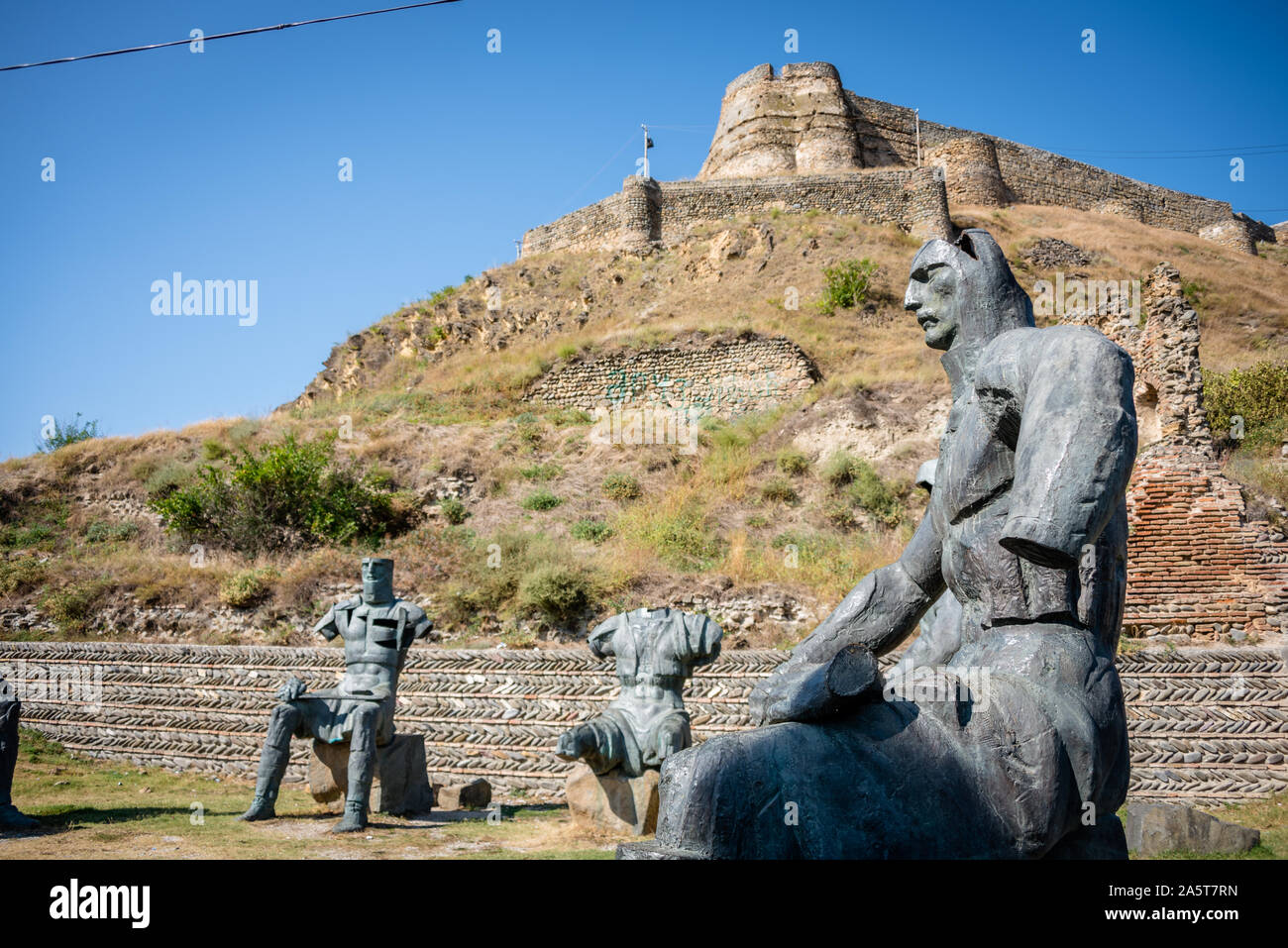 The Memorial of Georgian Warrior Heroes with castle at the back Gori ...