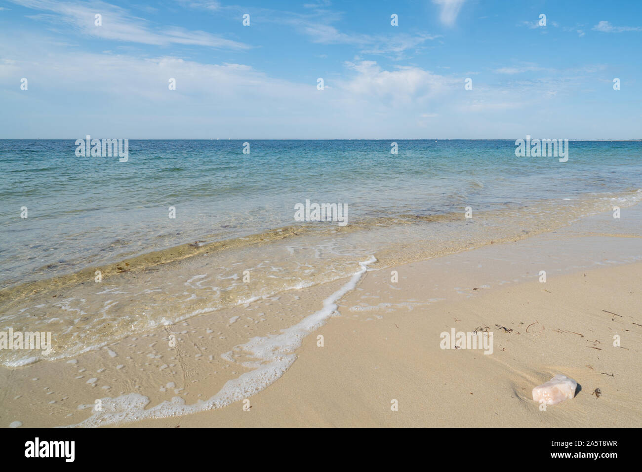 Serene empty beach gentle waves hi-res stock photography and images - Alamy