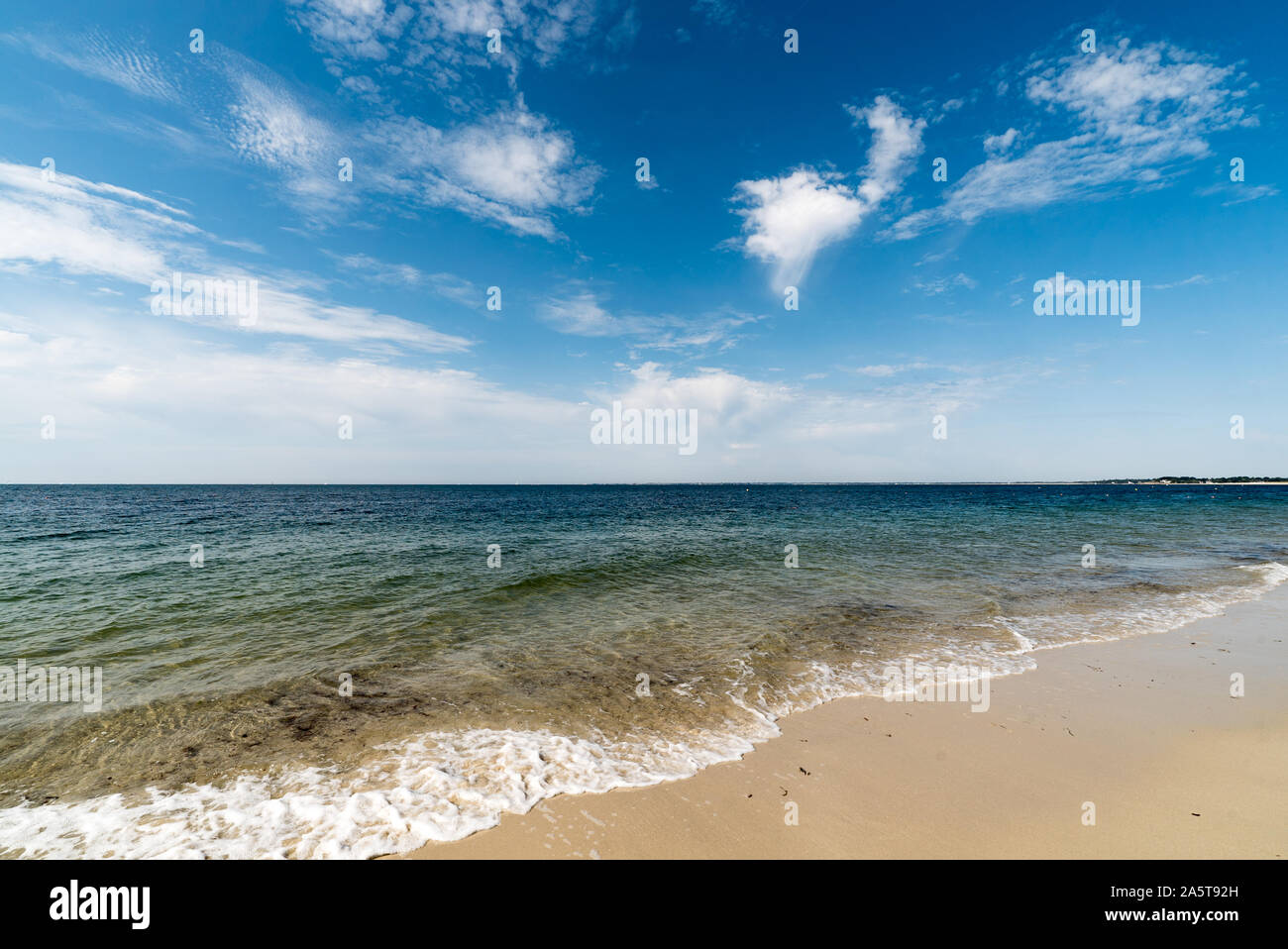 Serene empty beach gentle waves hi-res stock photography and images - Alamy