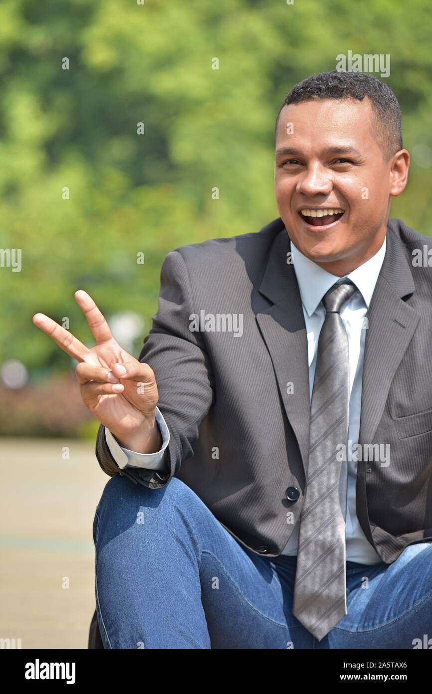 Business Executive And Peace Sign Stock Photo - Alamy