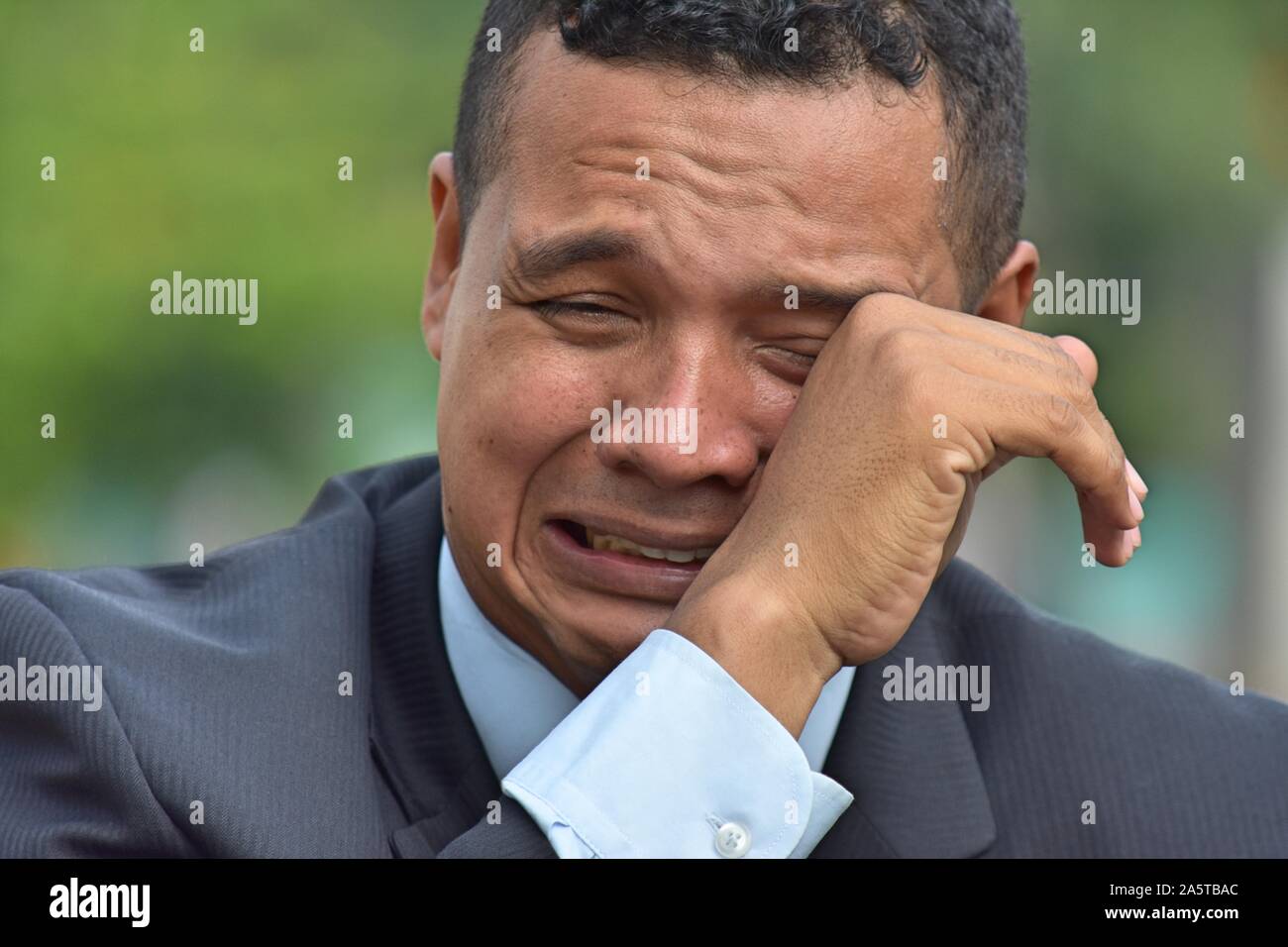 Crying Business Man Stock Photo - Alamy