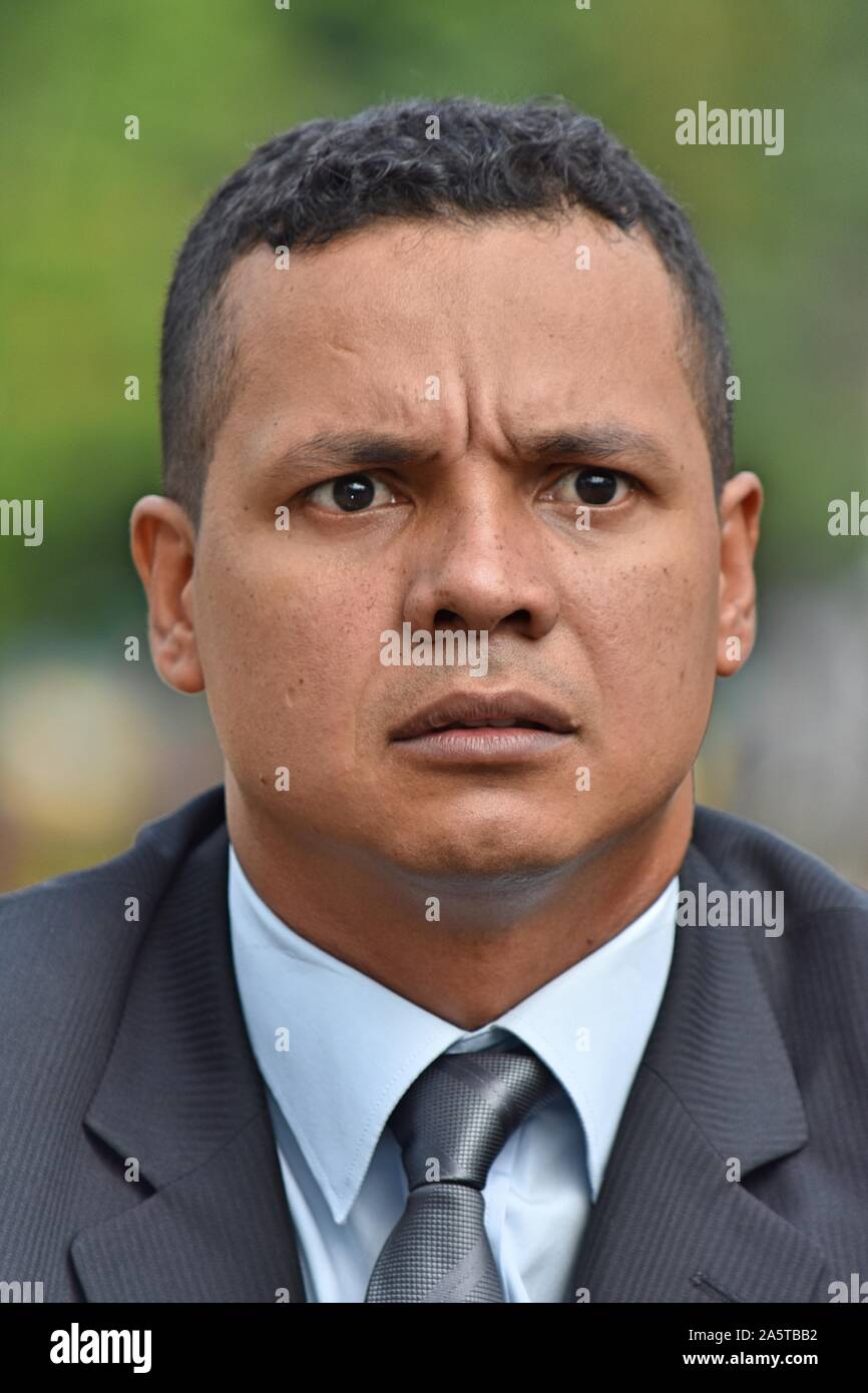 Confused Handsome Business Executive Stock Photo - Alamy
