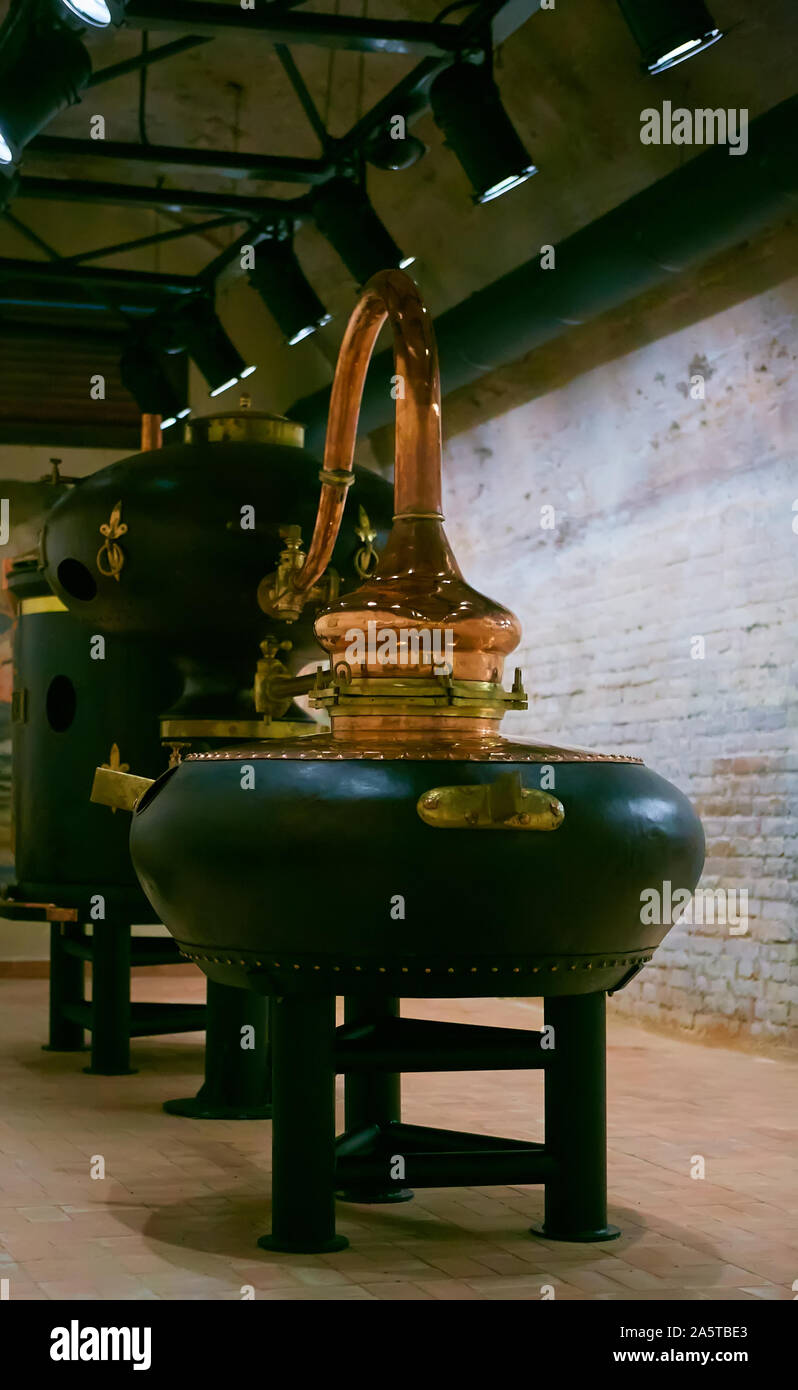medieval traditional distiller, cube made from copper production of ...