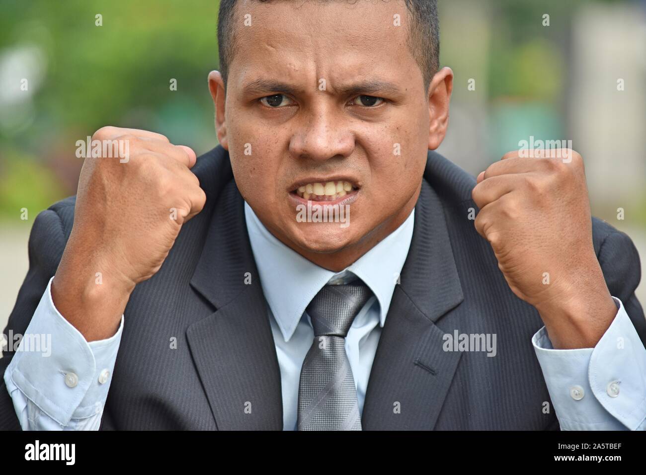 An Angry Handsome Person Wearing Suit Stock Photo - Alamy
