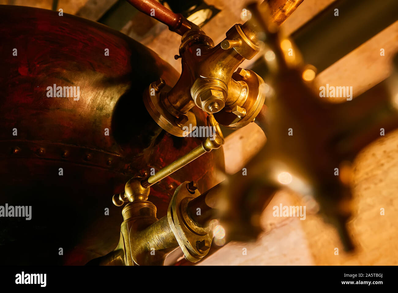 Detalis of medieval traditional distiller cube made from copper ...