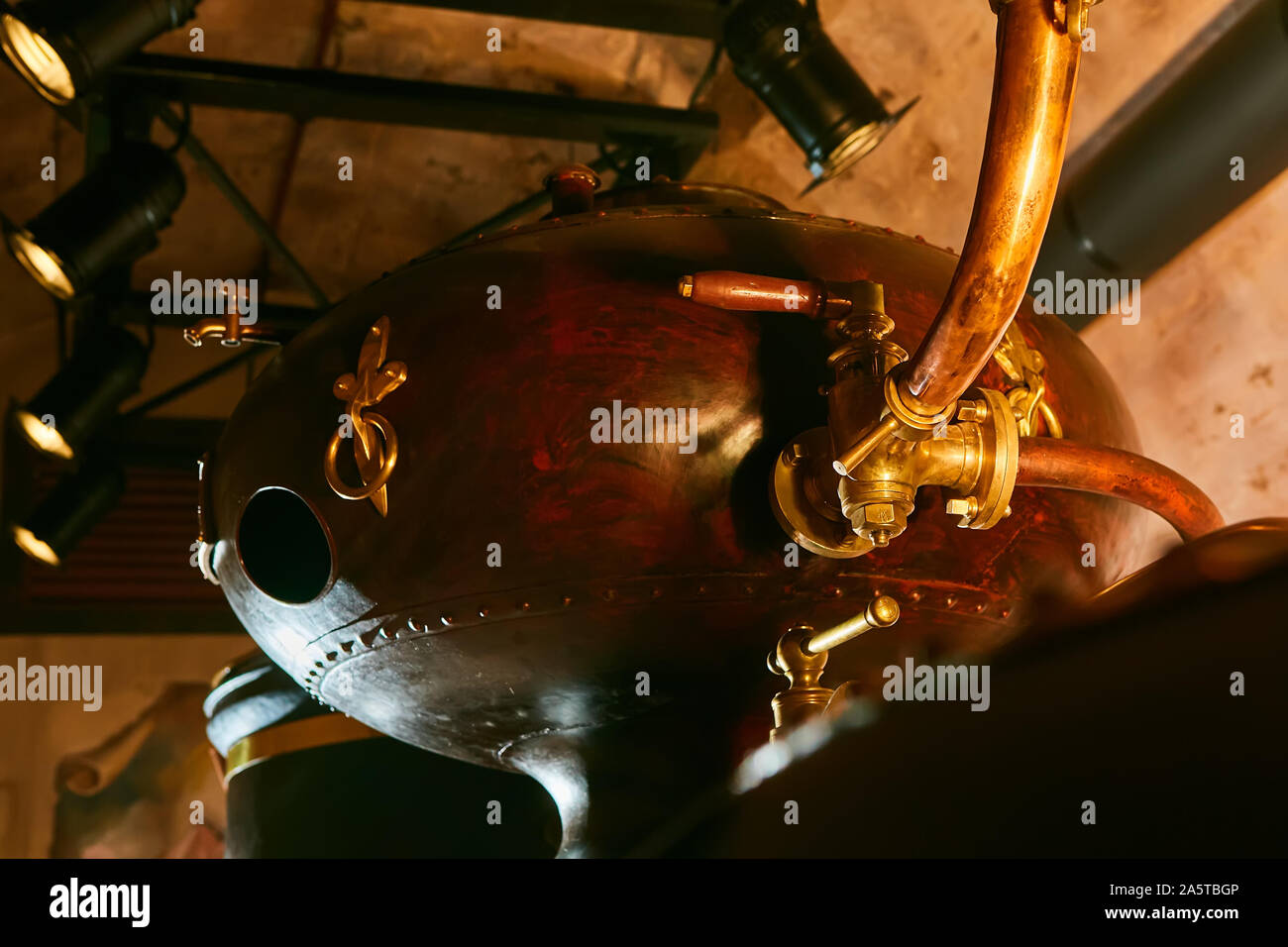 Detalis of medieval traditional distiller cube made from copper ...