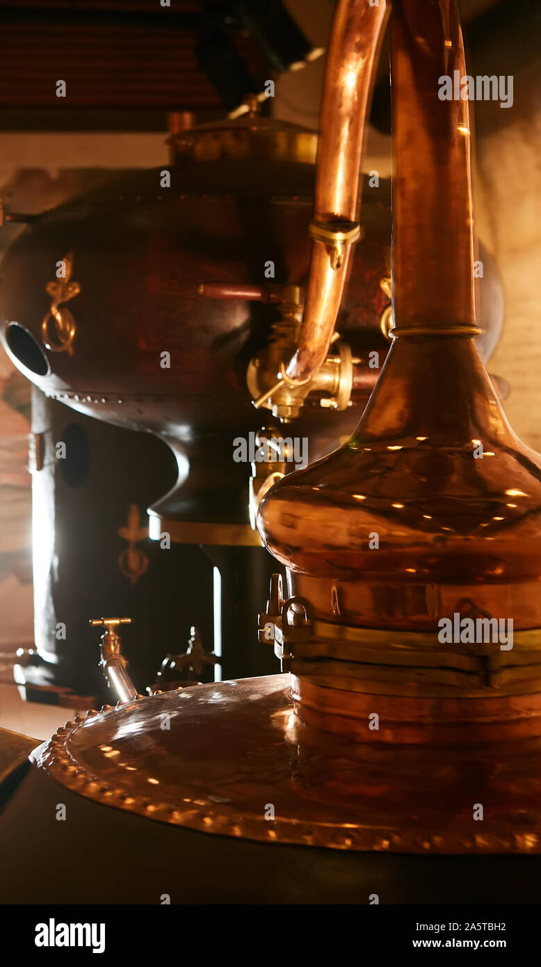 medieval traditional distiller, cube made from copper production of ...