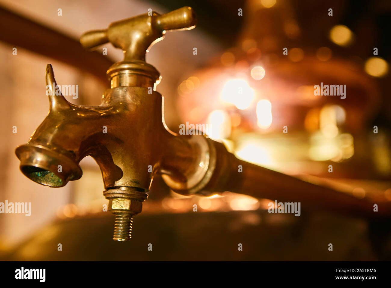 Detalis of medieval traditional distiller cube made from copper ...