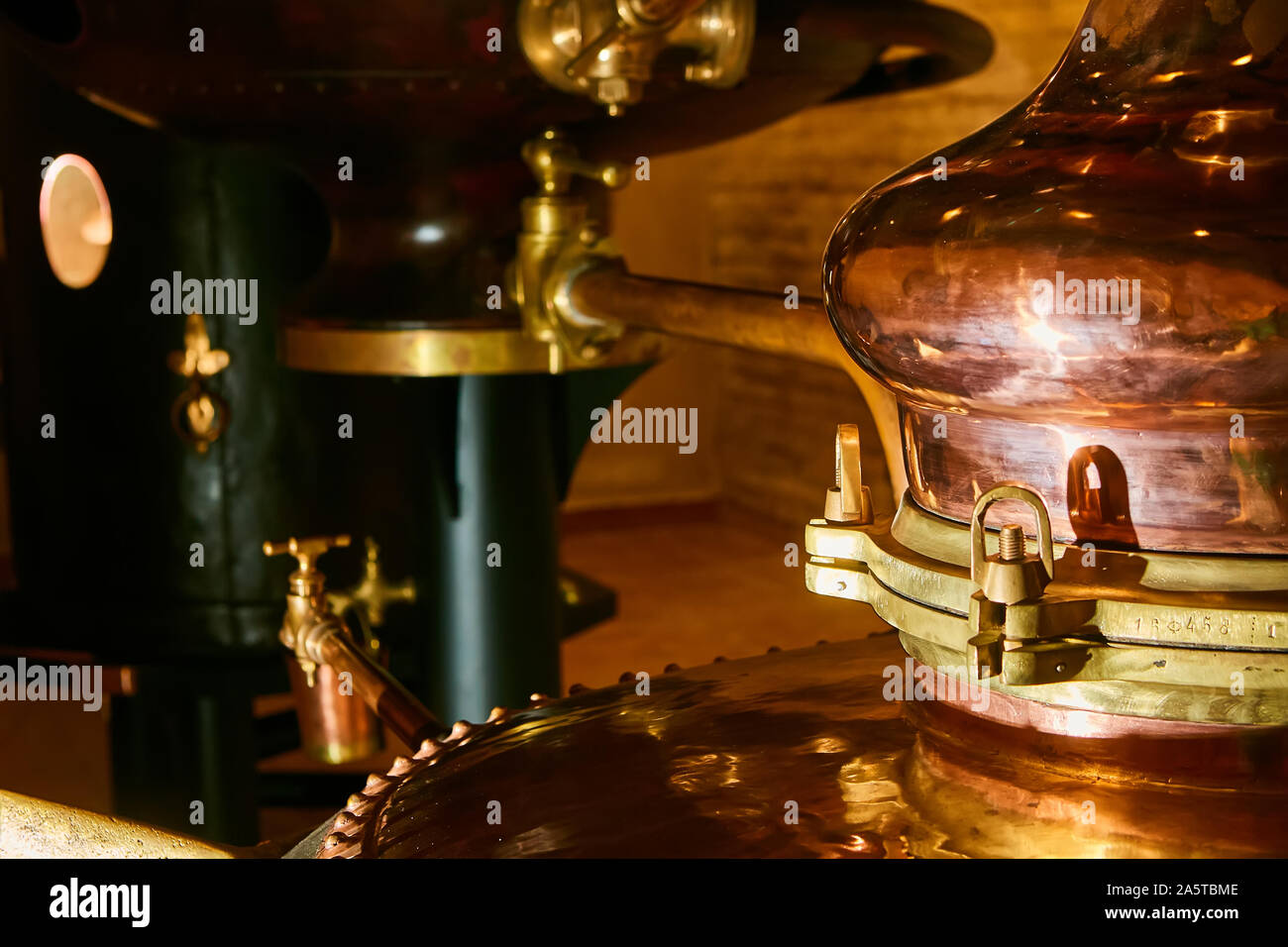 Detalis of medieval traditional distiller cube made from copper ...