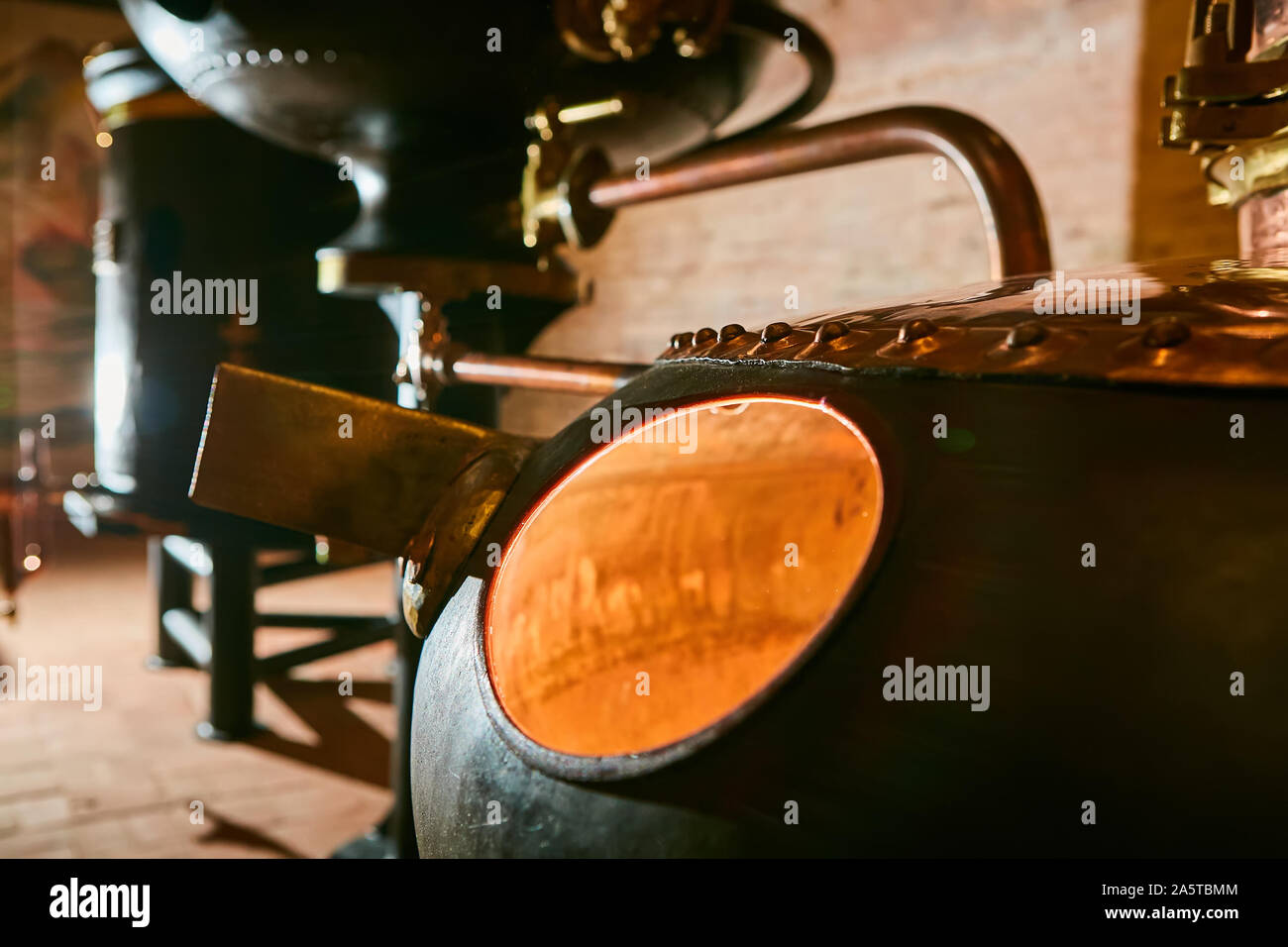 Detalis of medieval traditional distiller cube made from copper ...