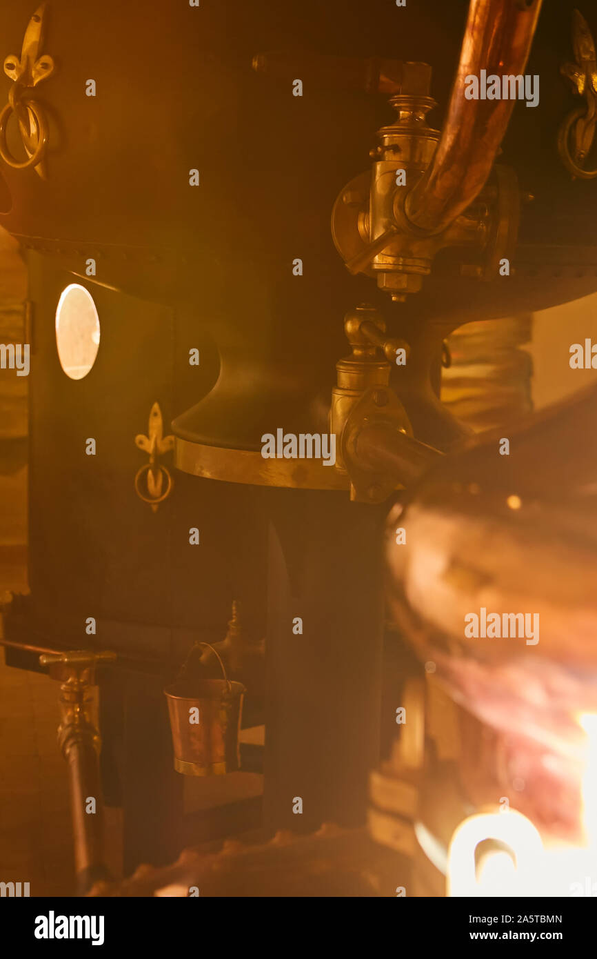 Detalis of medieval traditional distiller cube made from copper ...