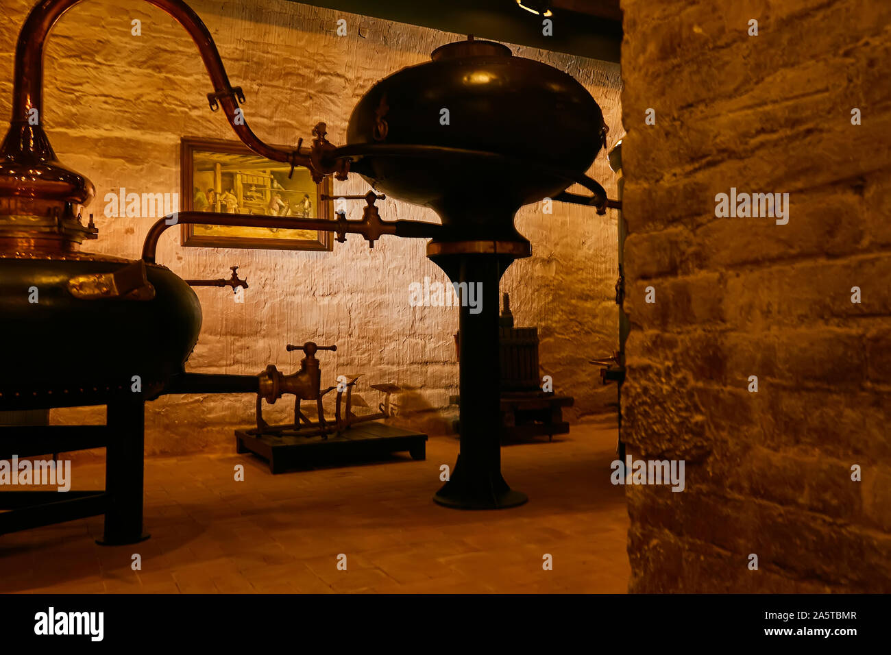 medieval traditional distiller, cube made from copper production of ...