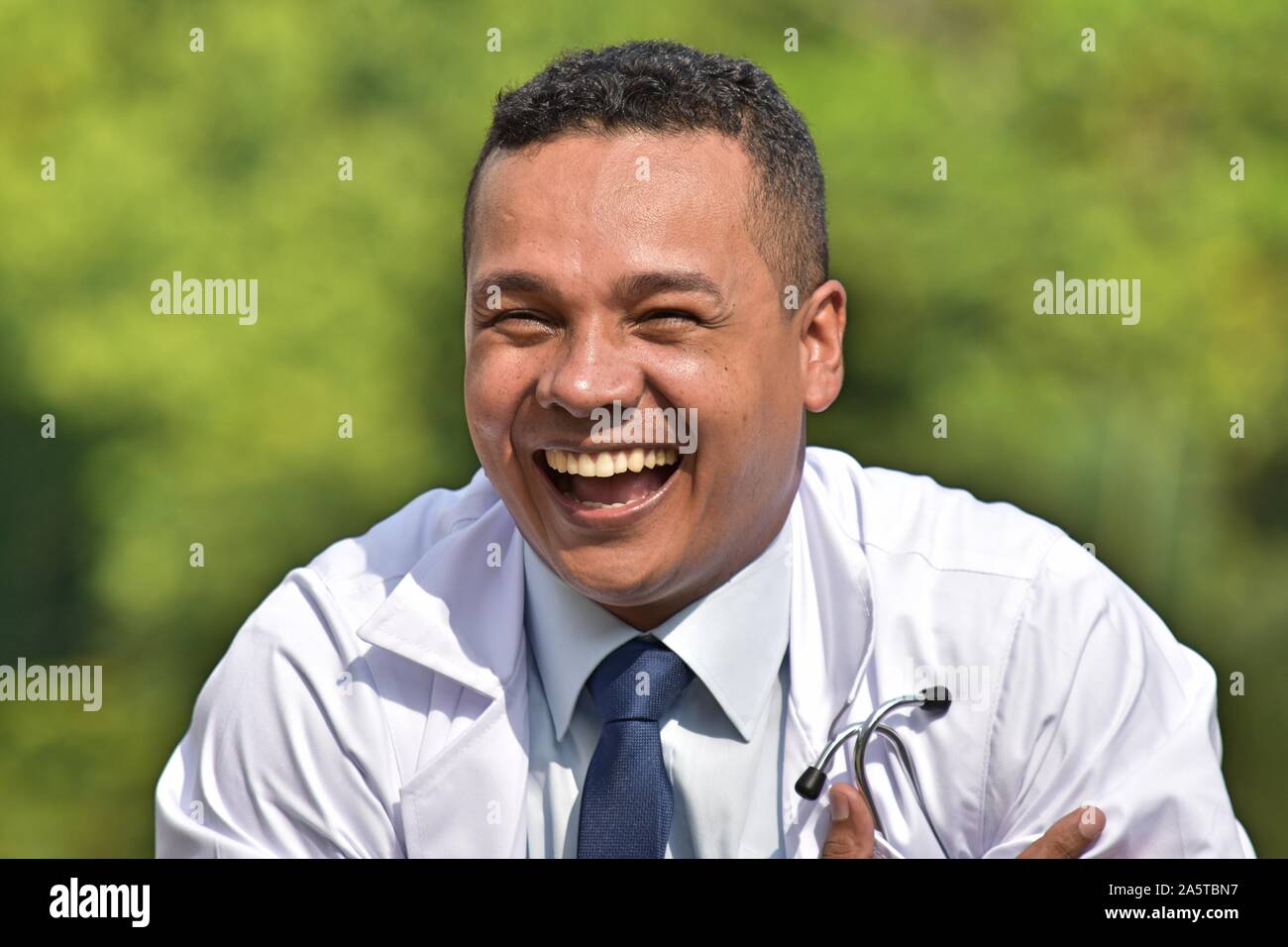Smiling Male Doctor Wearing Lab Coat Stock Photo - Alamy