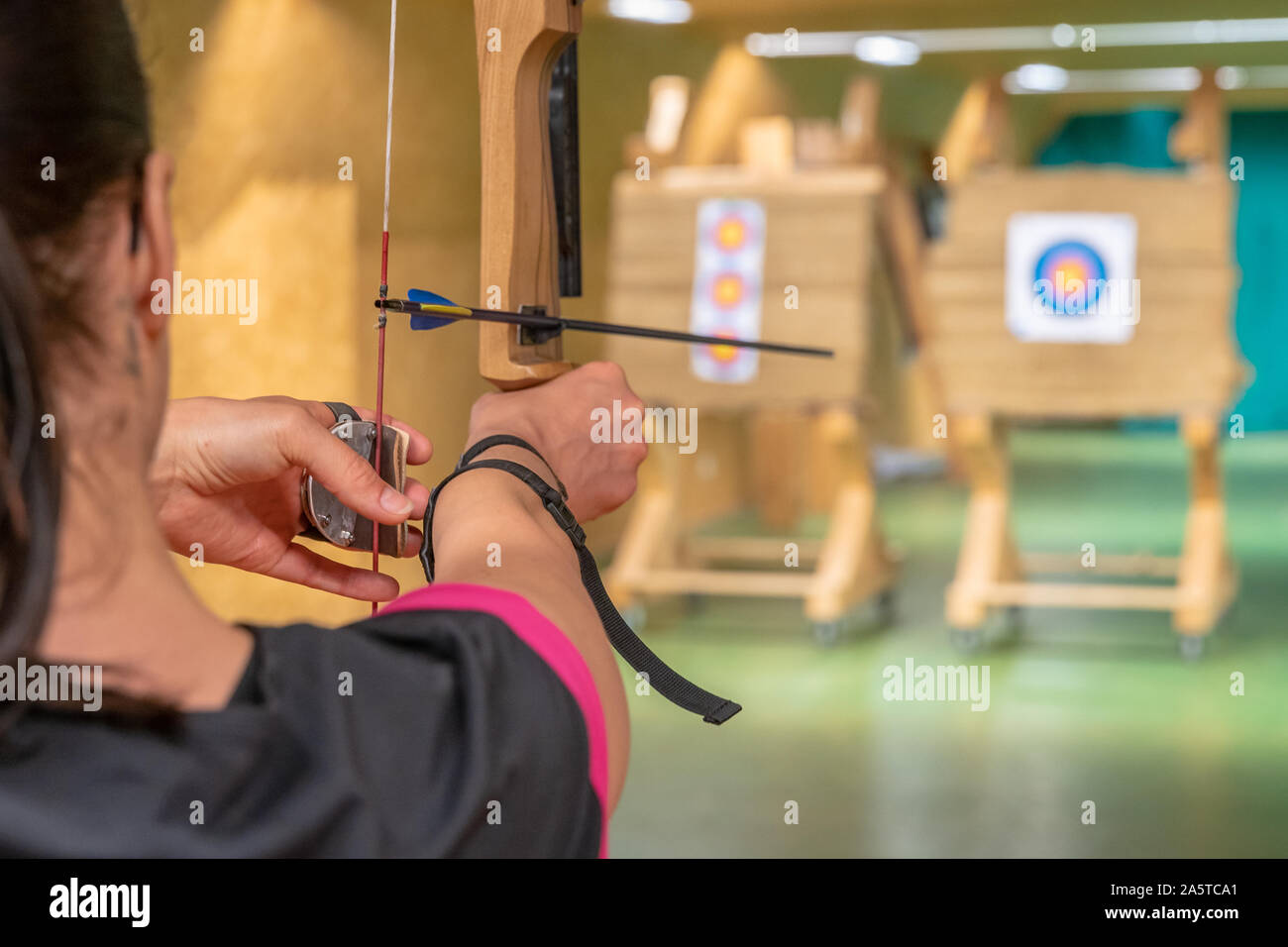 archery in the sports hall. Competition for the best shot an arrow into ...