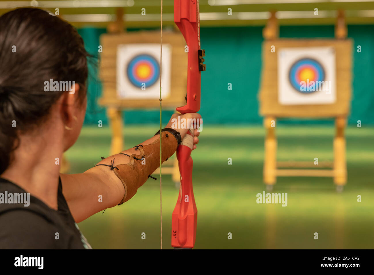 archery in the sports hall. Competition for the best shot an arrow into ...