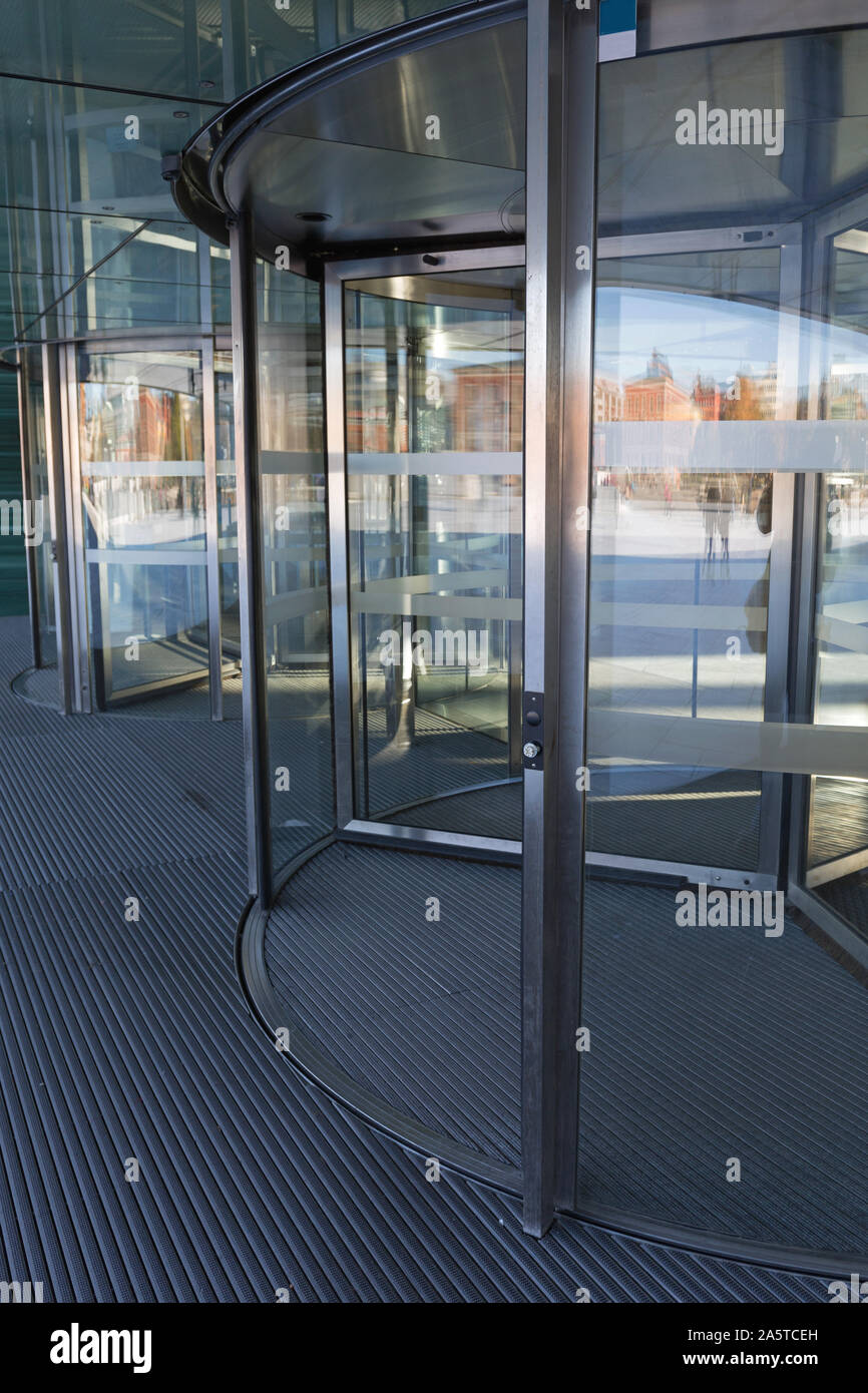 Automatic Revolving Doors at Modern Building Entrance Stock Photo - Alamy