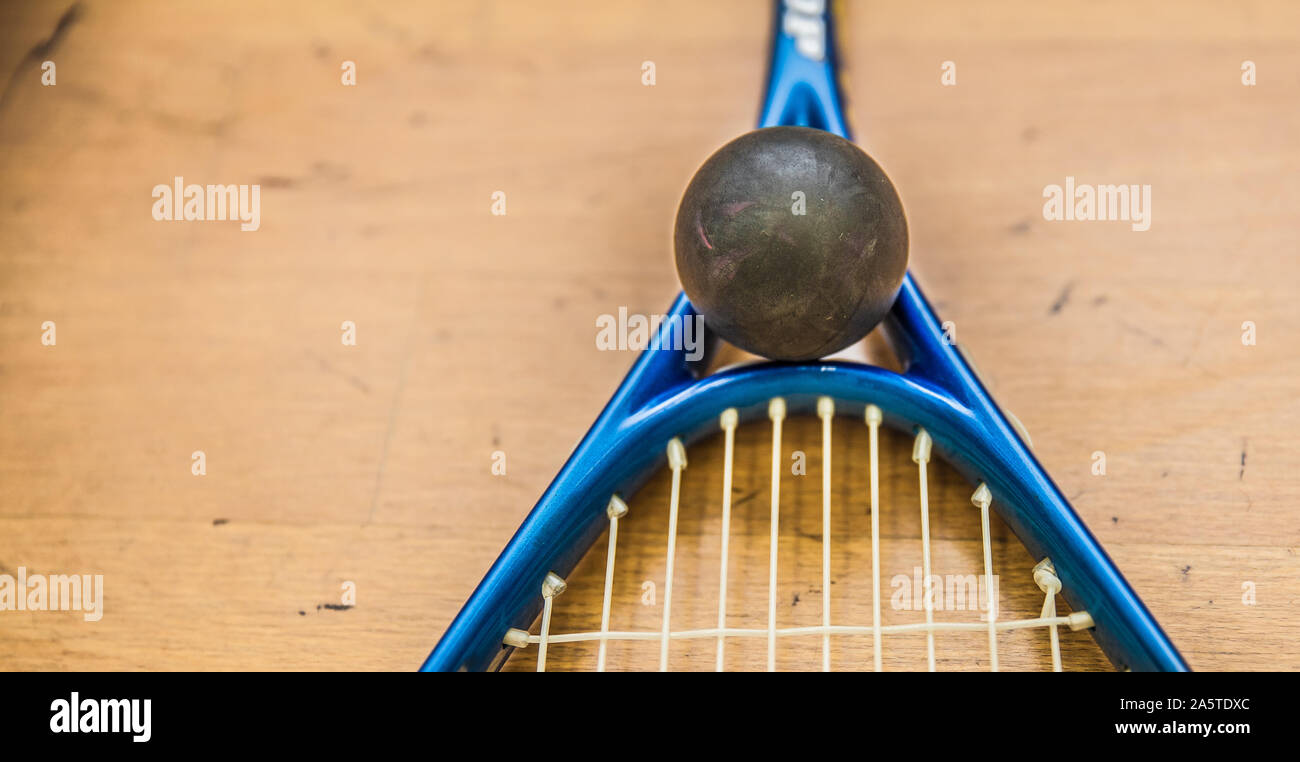 squash ball on court with squash rackets ready to play. Film editions ...