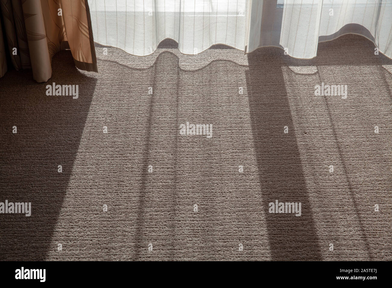 Shining through the curtain hi-res stock photography and images - Alamy