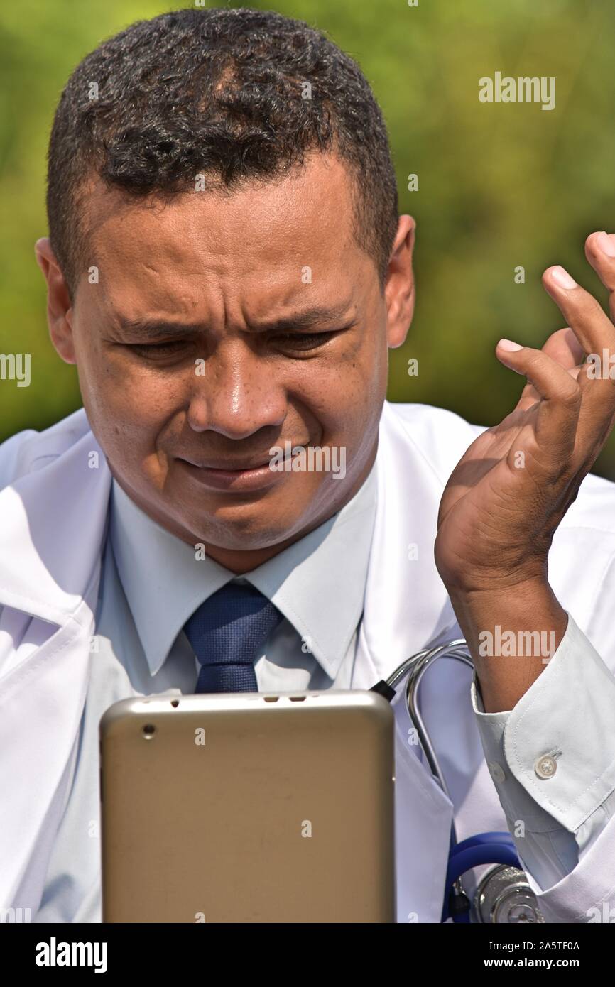 Confused male doctor using hi-res stock photography and images - Alamy
