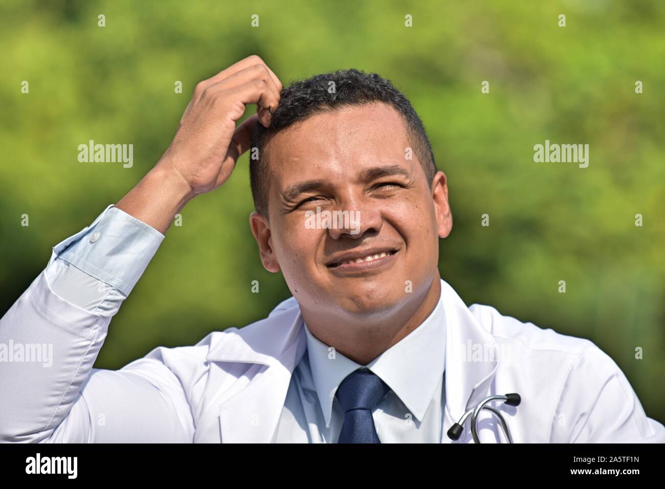 Male Doctor Thinking Wearing Lab Coat Stock Photo - Alamy