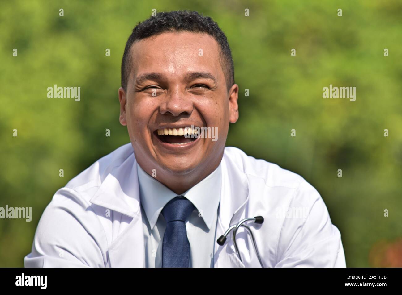 Hispanic Male Doctor Smiling Stock Photo - Alamy
