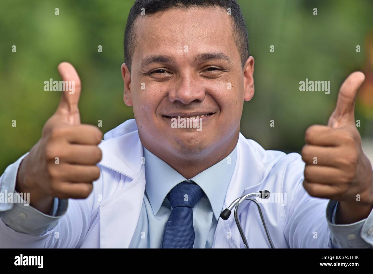 Successful Male Doctor Wearing Lab Coat Stock Photo - Alamy