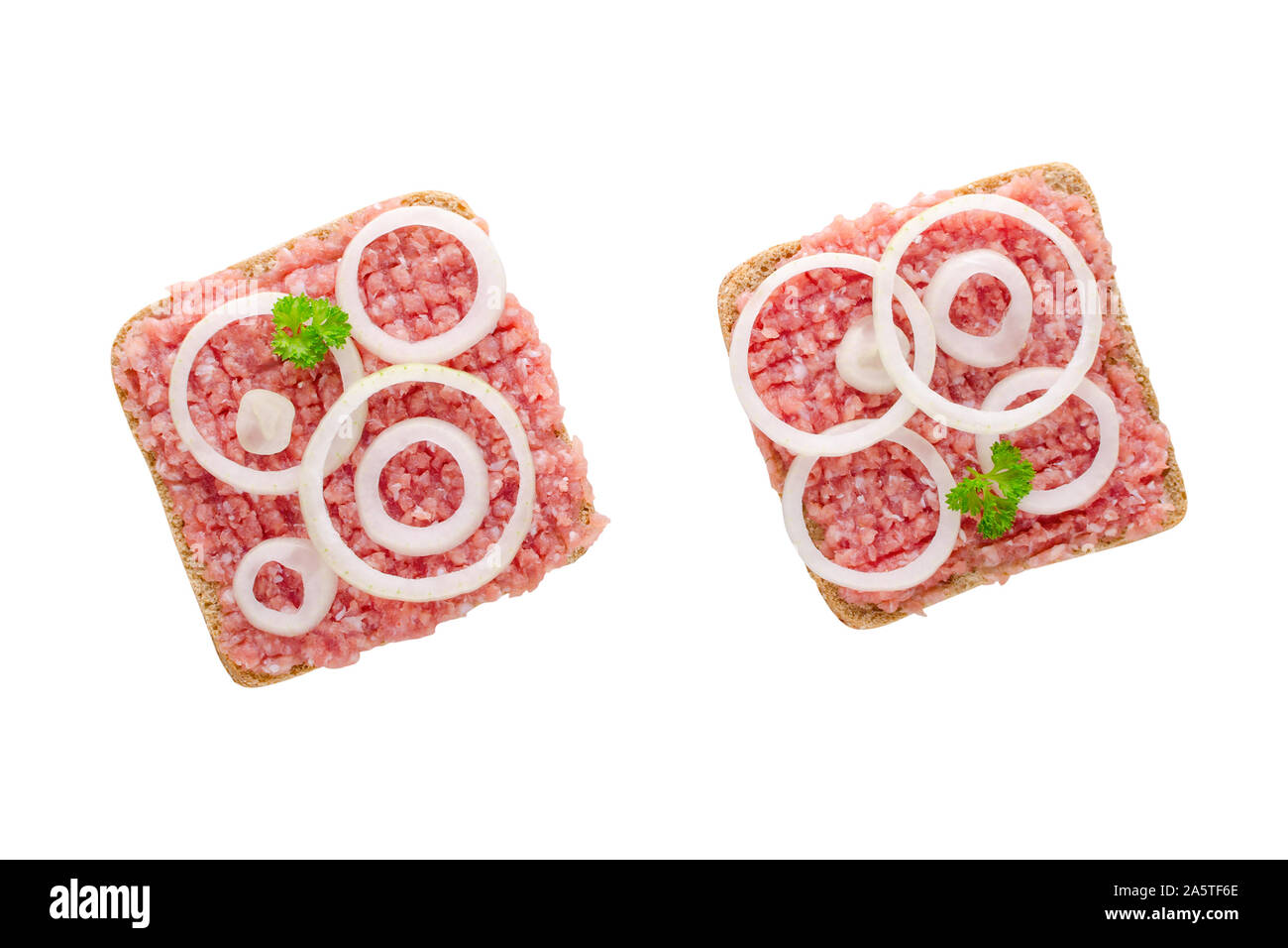 german sandwich mettbrotchen, bun and raw meat with onion and parsley ...