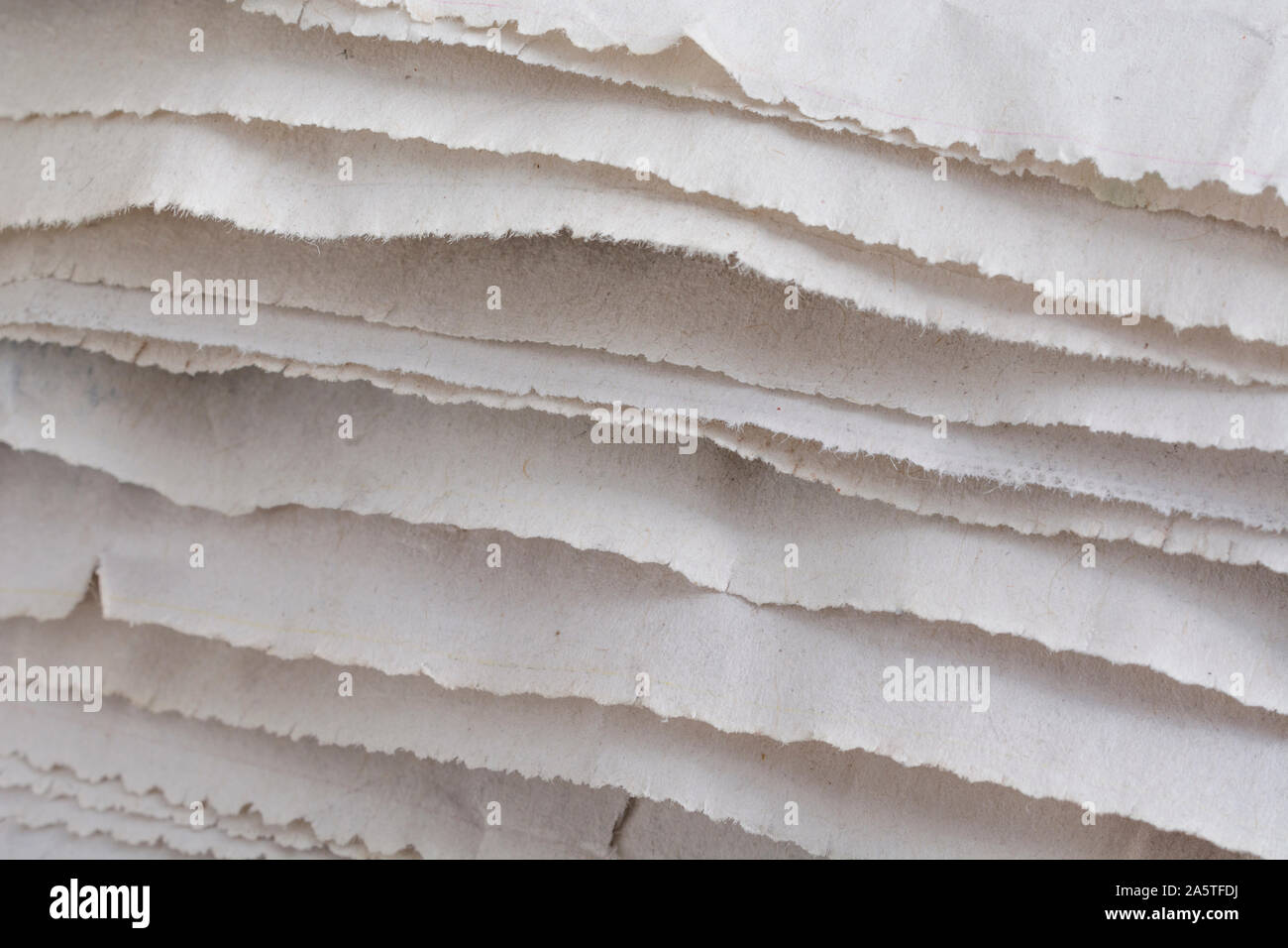 Old newspaper pages stacked. Traditional print media, front page news ...