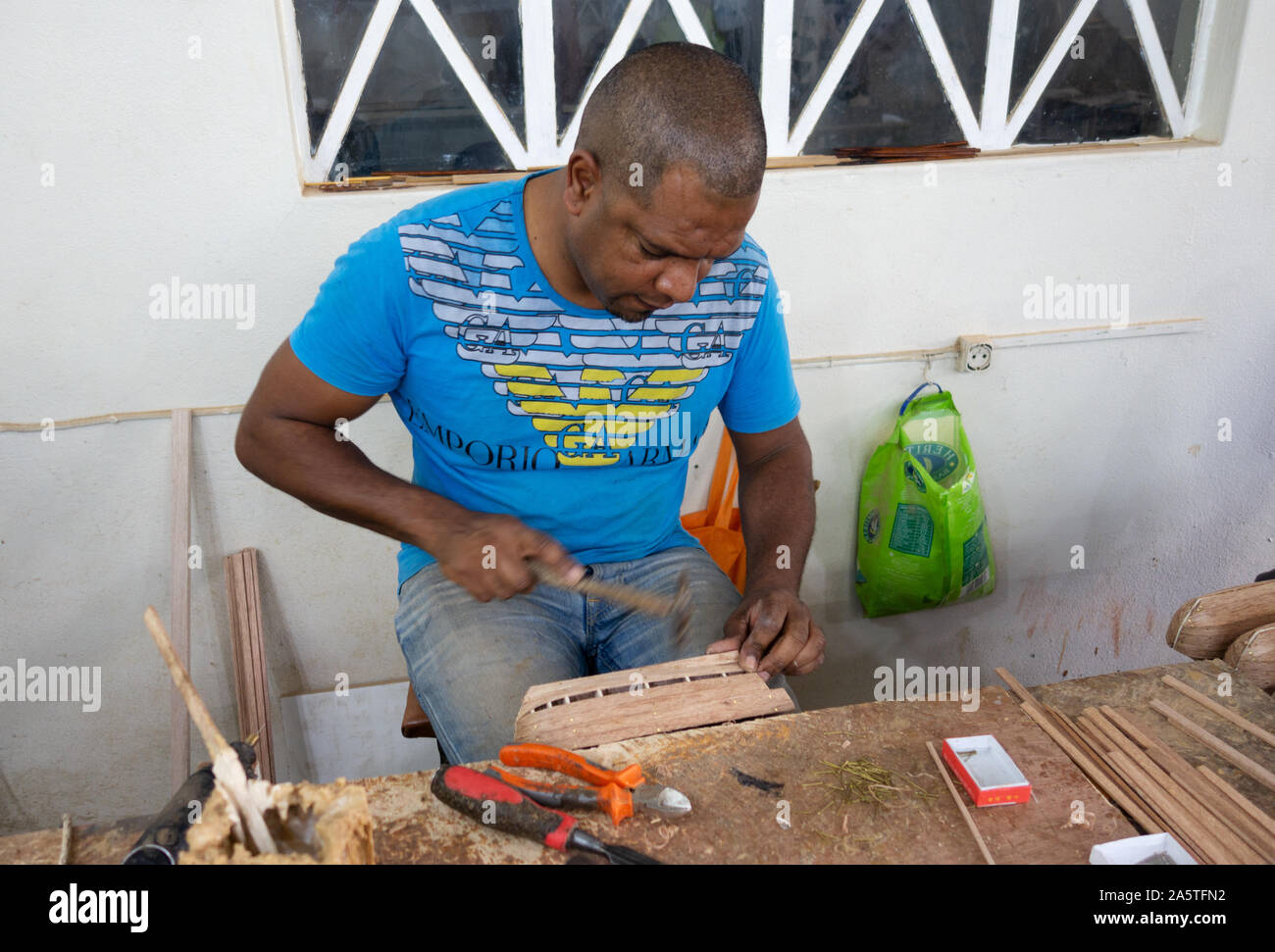 Mauritius craft; a local mauritian craftsman making model boats and ...