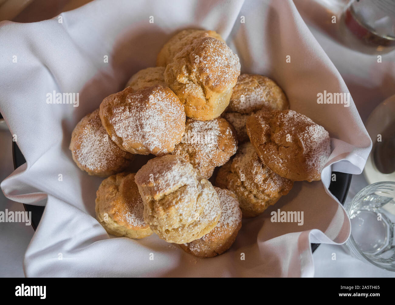Delicious Close Up Of Scones From Eynsham Hall In A White Napkin Exquisite English Baker Food delicious-close-up-of-scones-from-eynsham-hall-in-a-white-napkin-exquisite-english-baker-food