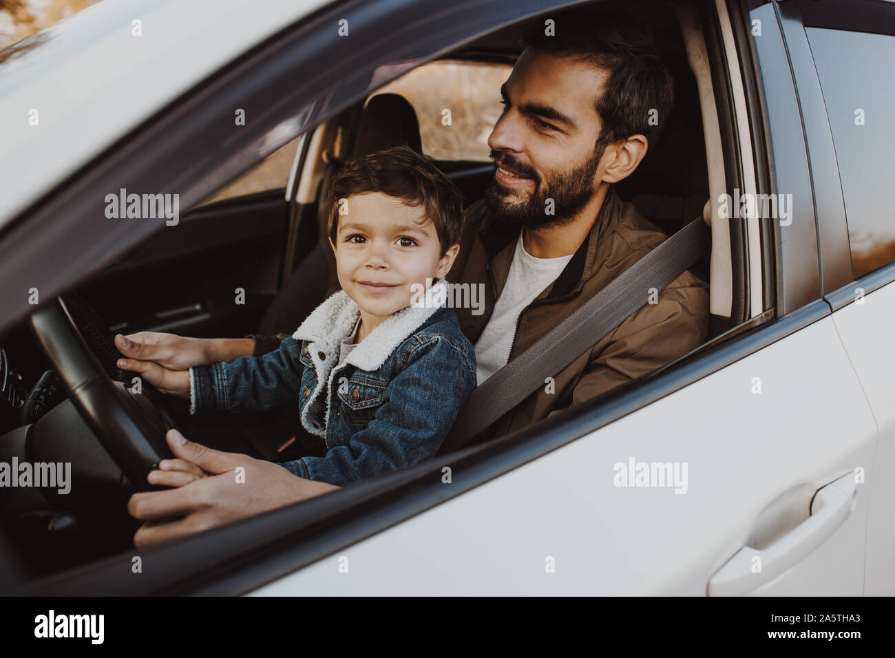 Father teach son drive hi-res stock photography and images - Alamy