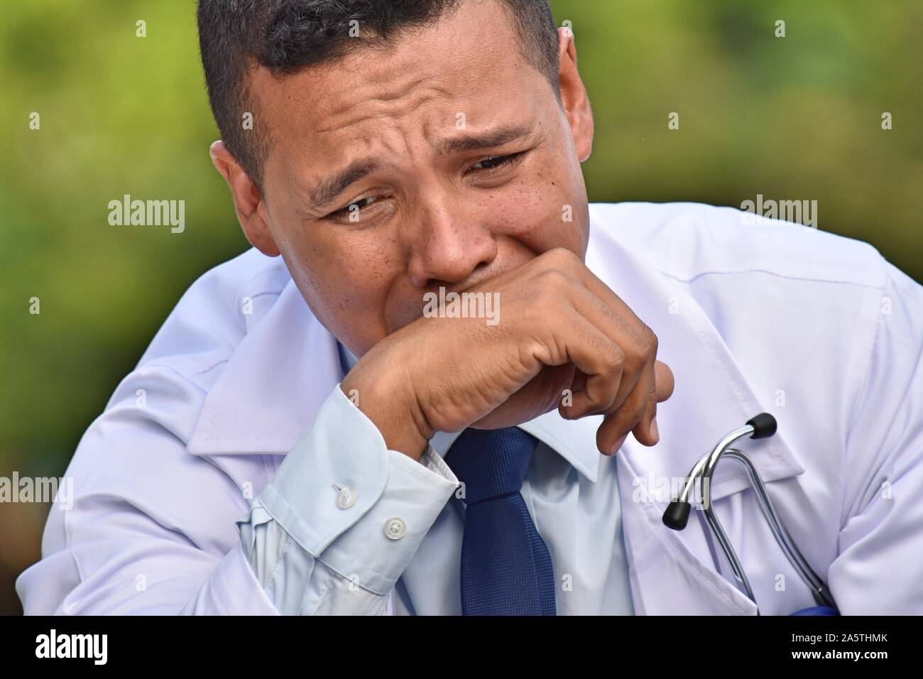 Crying doctor hi-res stock photography and images - Alamy