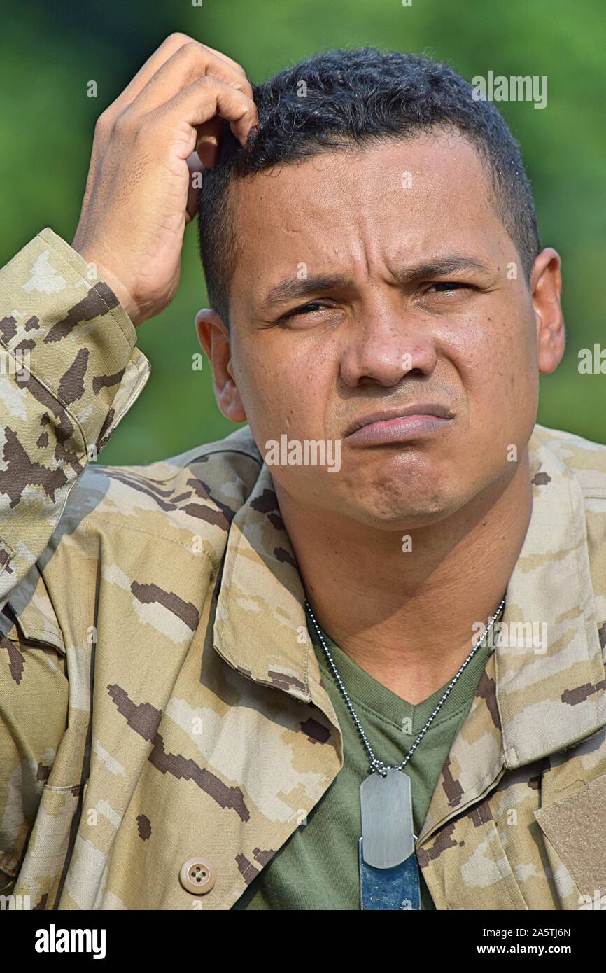 Young Soldier And Confusion Stock Photo - Alamy