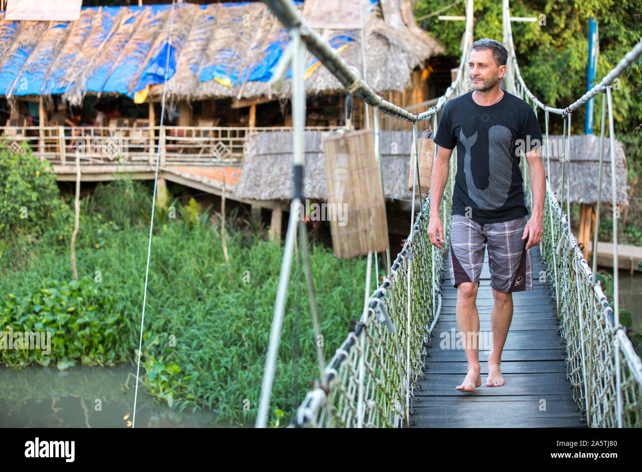 Walk on suspension bridge in hi-res stock photography and images - Alamy