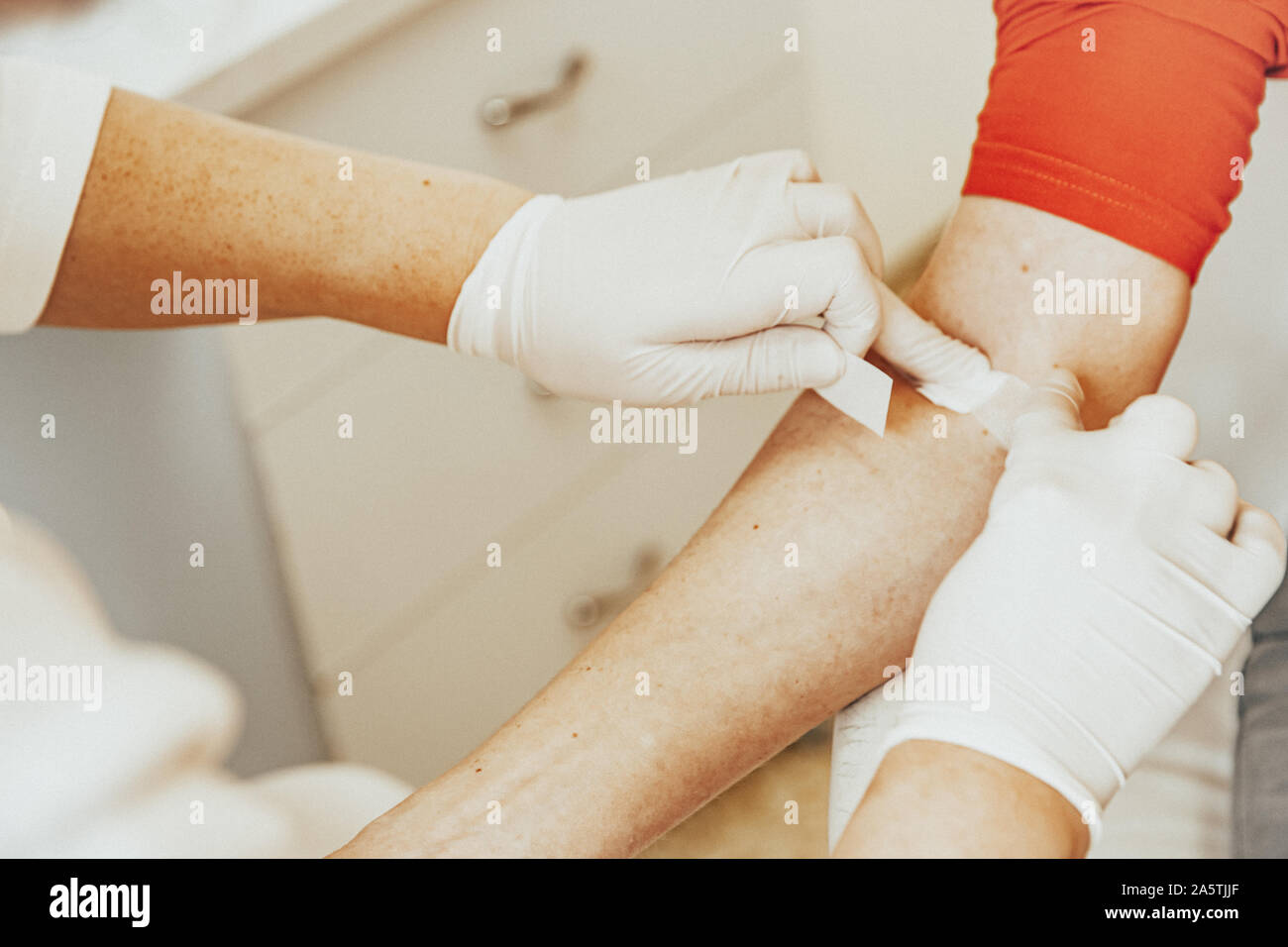Woman in hospital for blood collection. Blood tests for the disease in ...