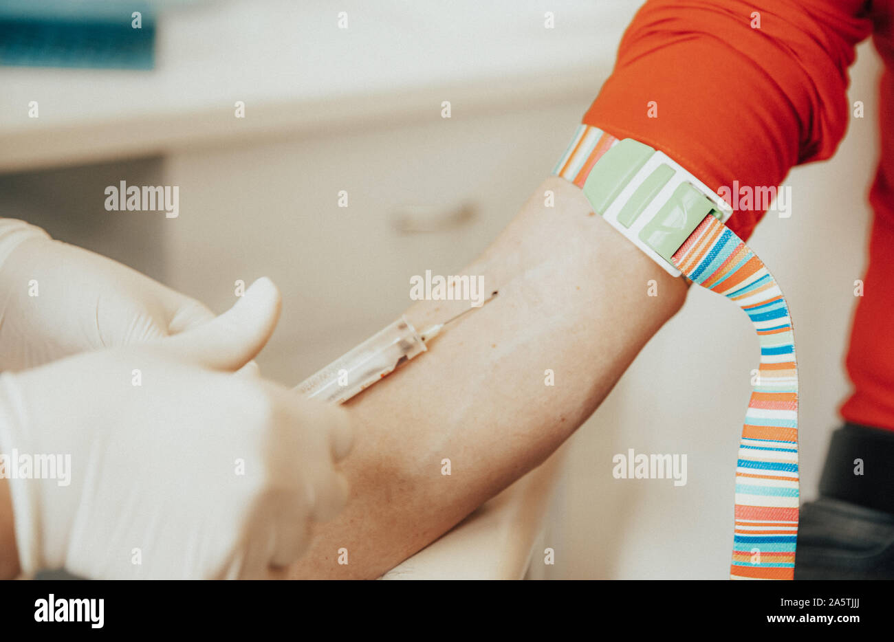 Woman in hospital for blood collection. Blood tests for the disease in ...