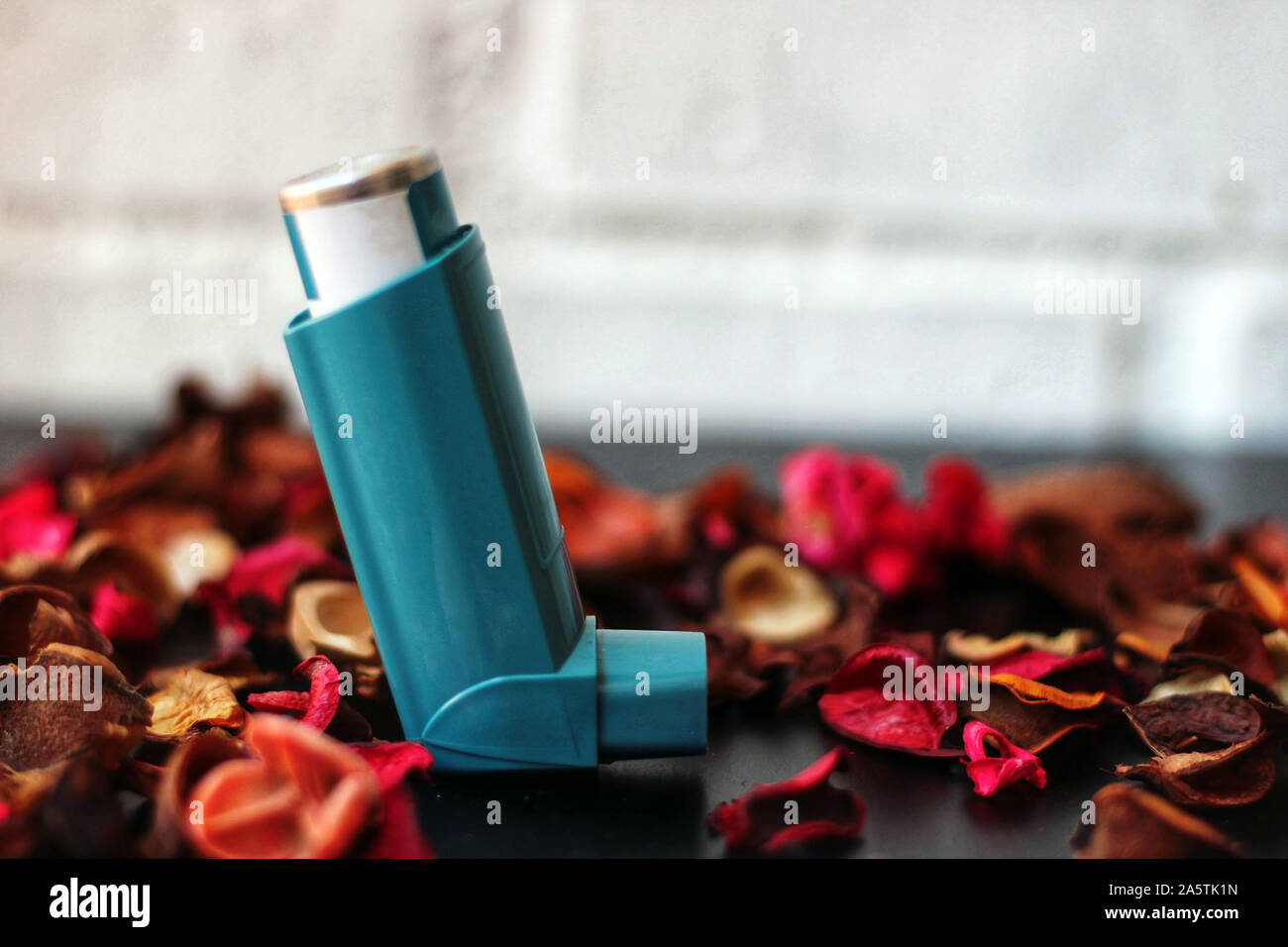 Medicine and health concept: Blue inhaler. Pharmaceutical product for ...