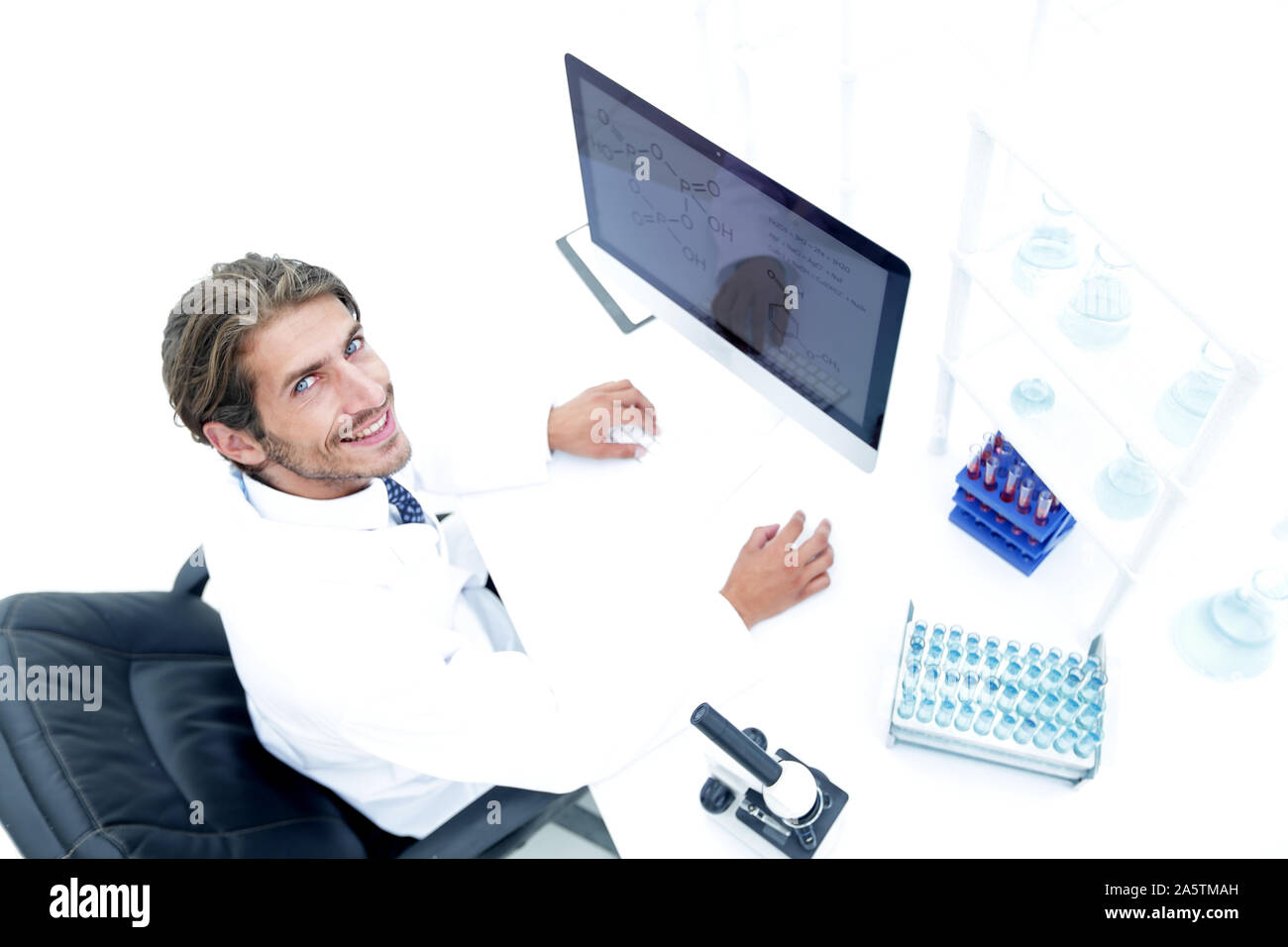 view from above of the scientist-doctor sitting on the computer Stock ...