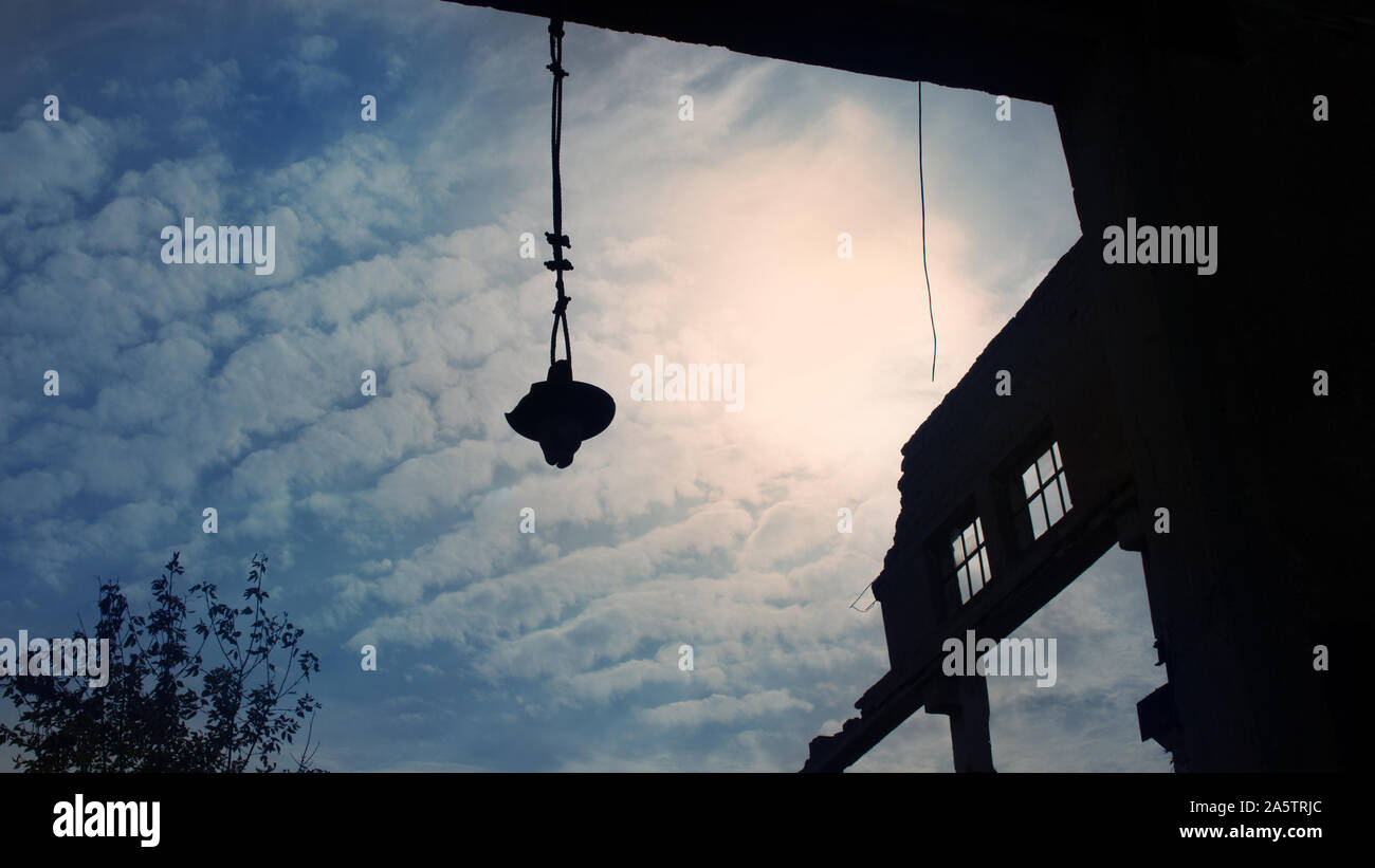 The broken lantern, empty Windows of the destroyed house, the torn off ...