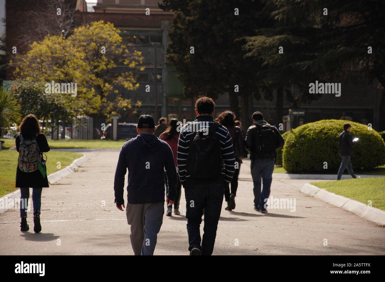 People walking down the path Stock Photo - Alamy