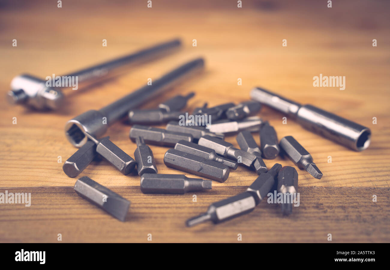 Set of bits for screwdriver. Metal bits for screwdriver. Nozzles and ...