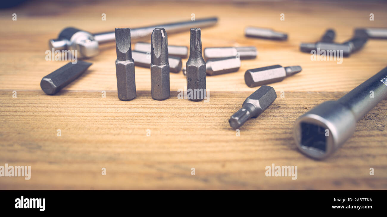 Set of bits for screwdriver. Metal bits for screwdriver. Nozzles and ...